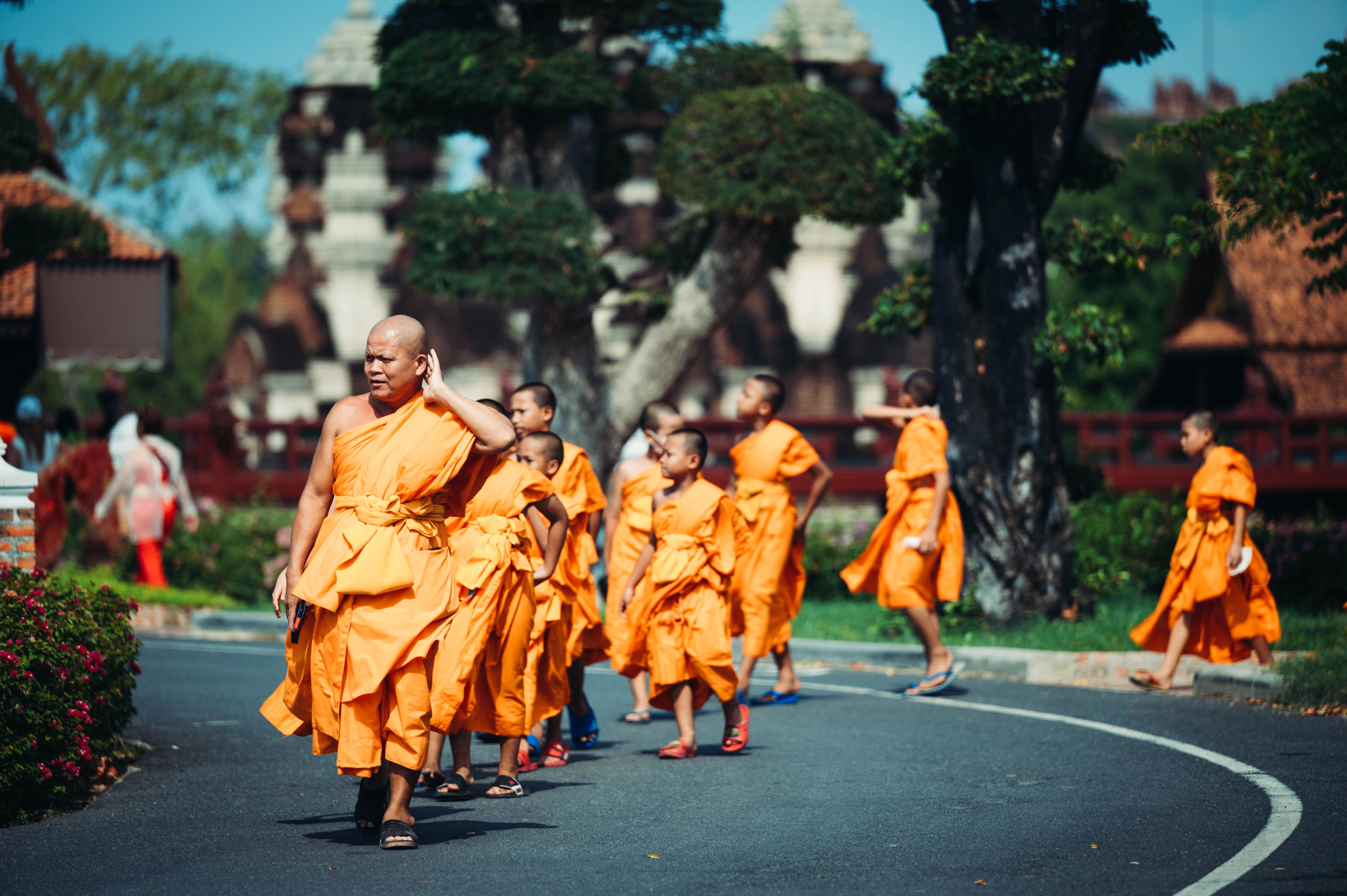 Men in Monk's Robe Talking about Buddhism · Free Stock Photo