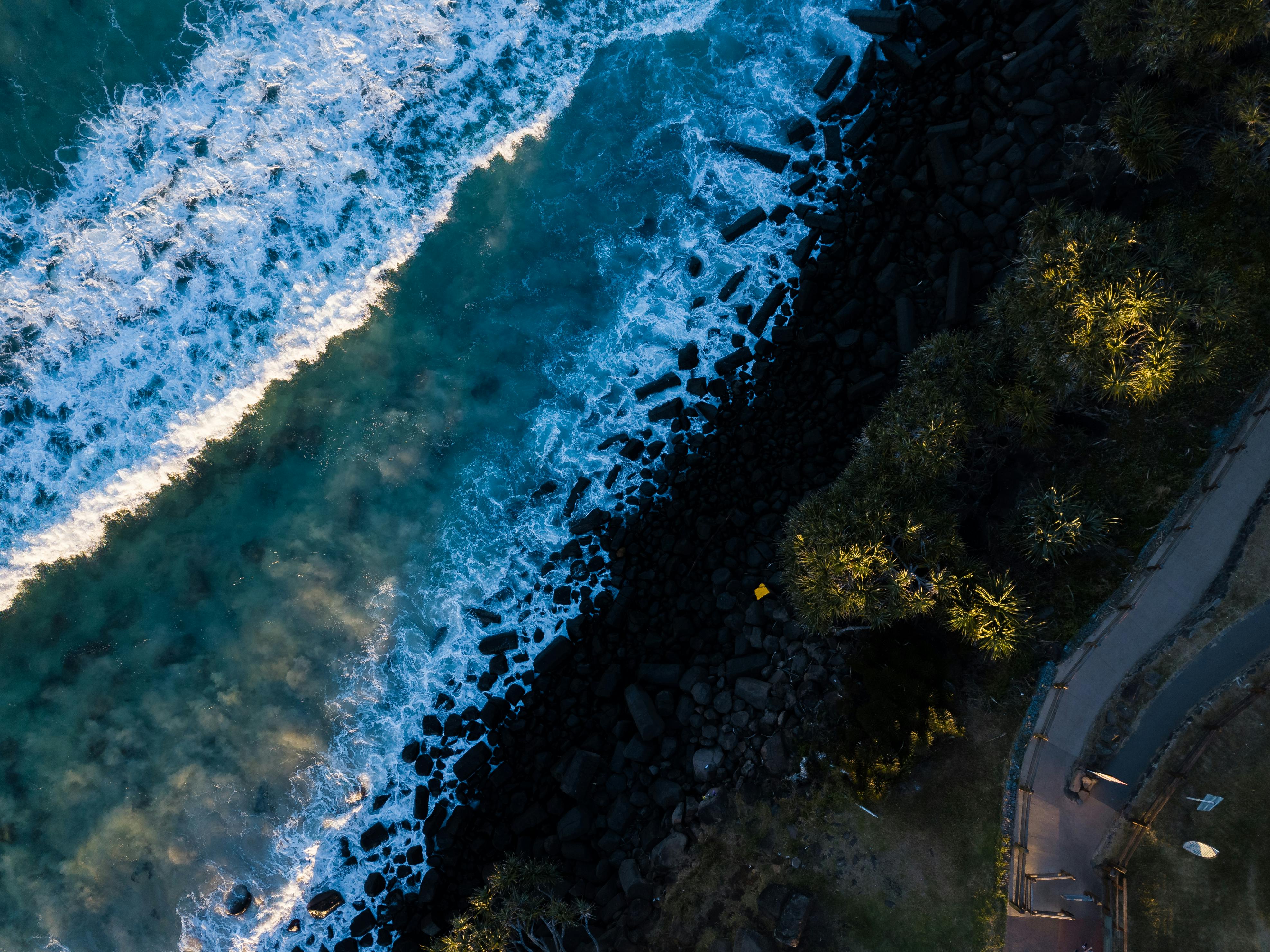 Top View Photo of Rocky Shore · Free Stock Photo