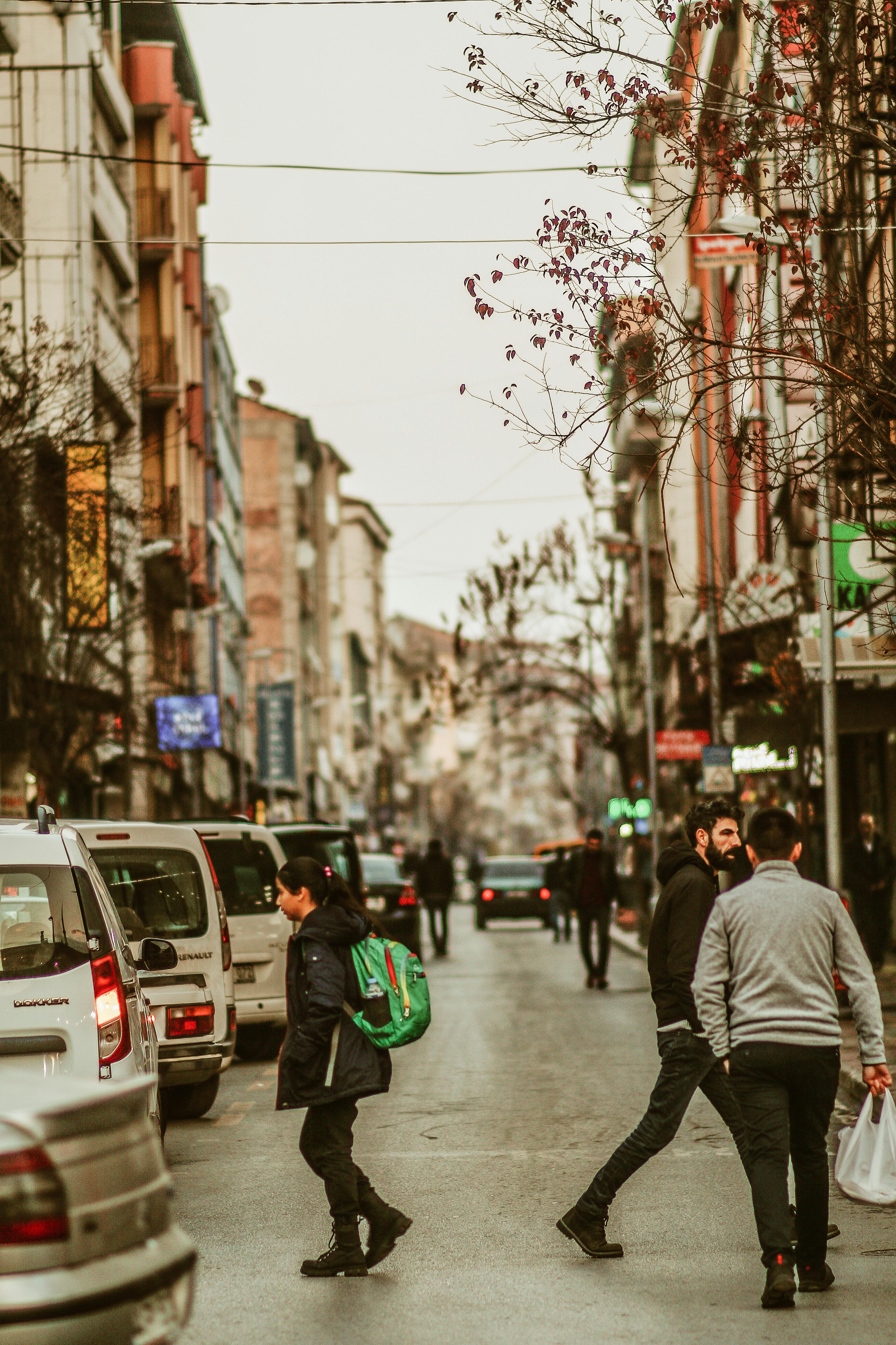 Grayscale Photography of People Walking Near Buildings · Free Stock Photo