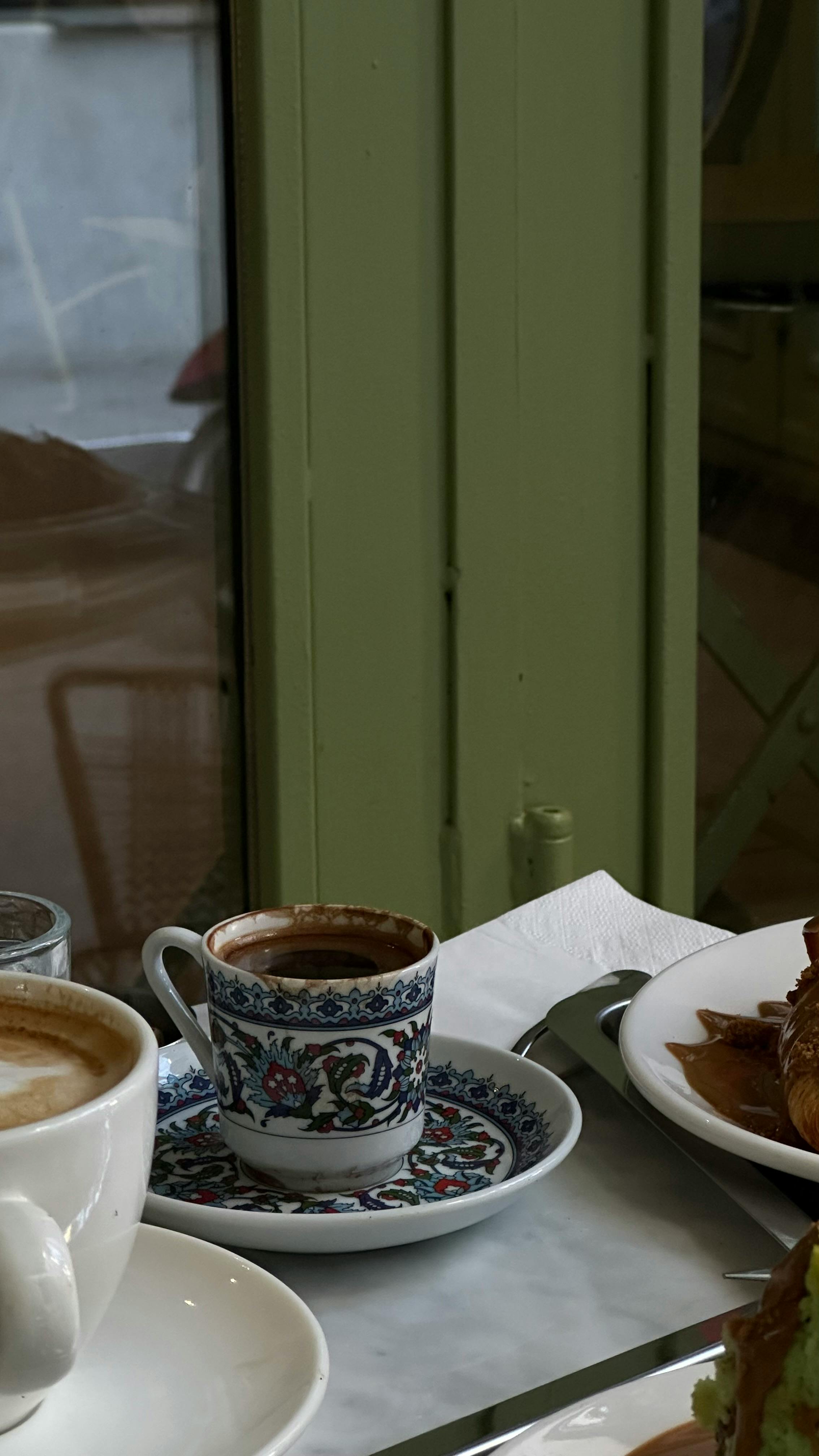 A Cup of Coffee on a Table · Free Stock Photo
