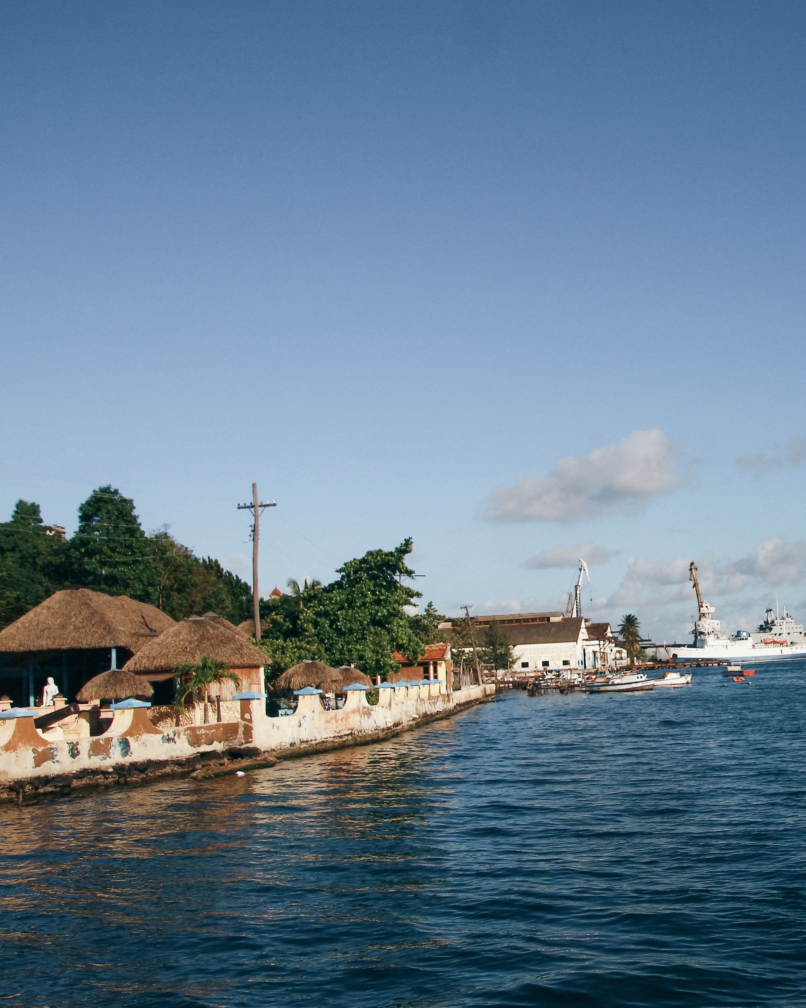 Tropical Landscape with a Resort and Harbor in the Background · Free ...