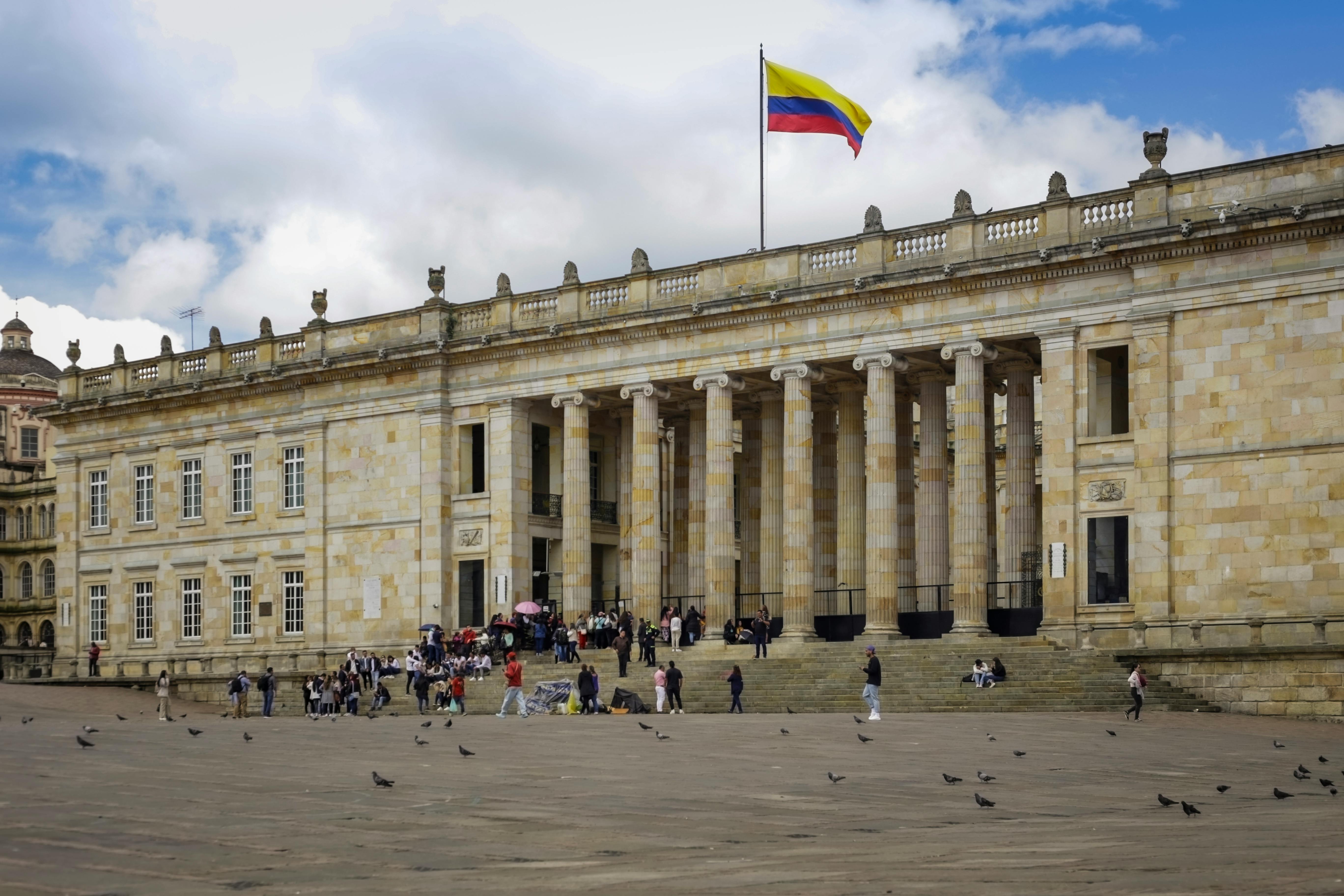People in front of the Capitolio Nacional in Bogota, Colombia · Free ...