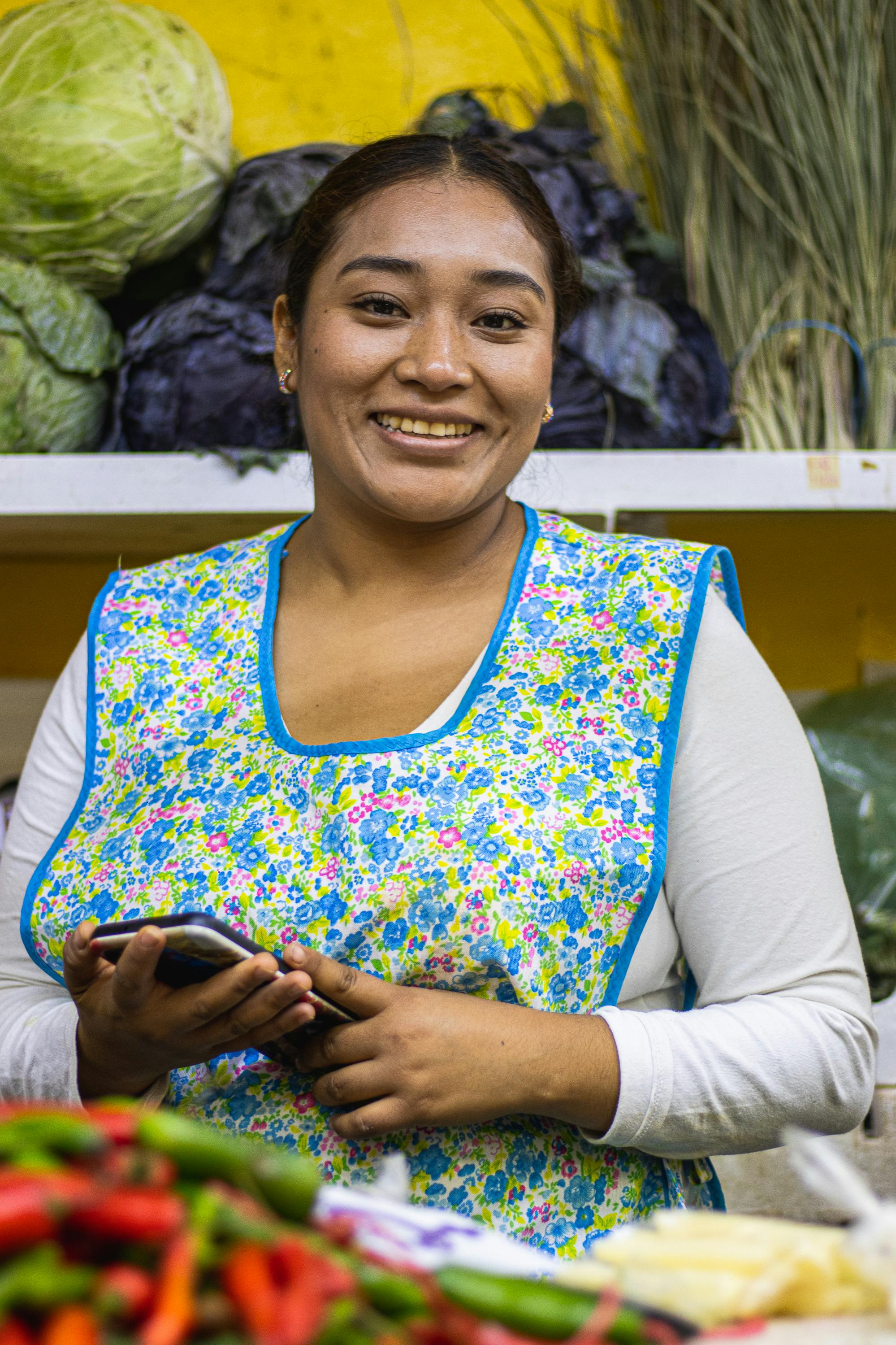 Merchant at Stall with Vegetables · Free Stock Photo