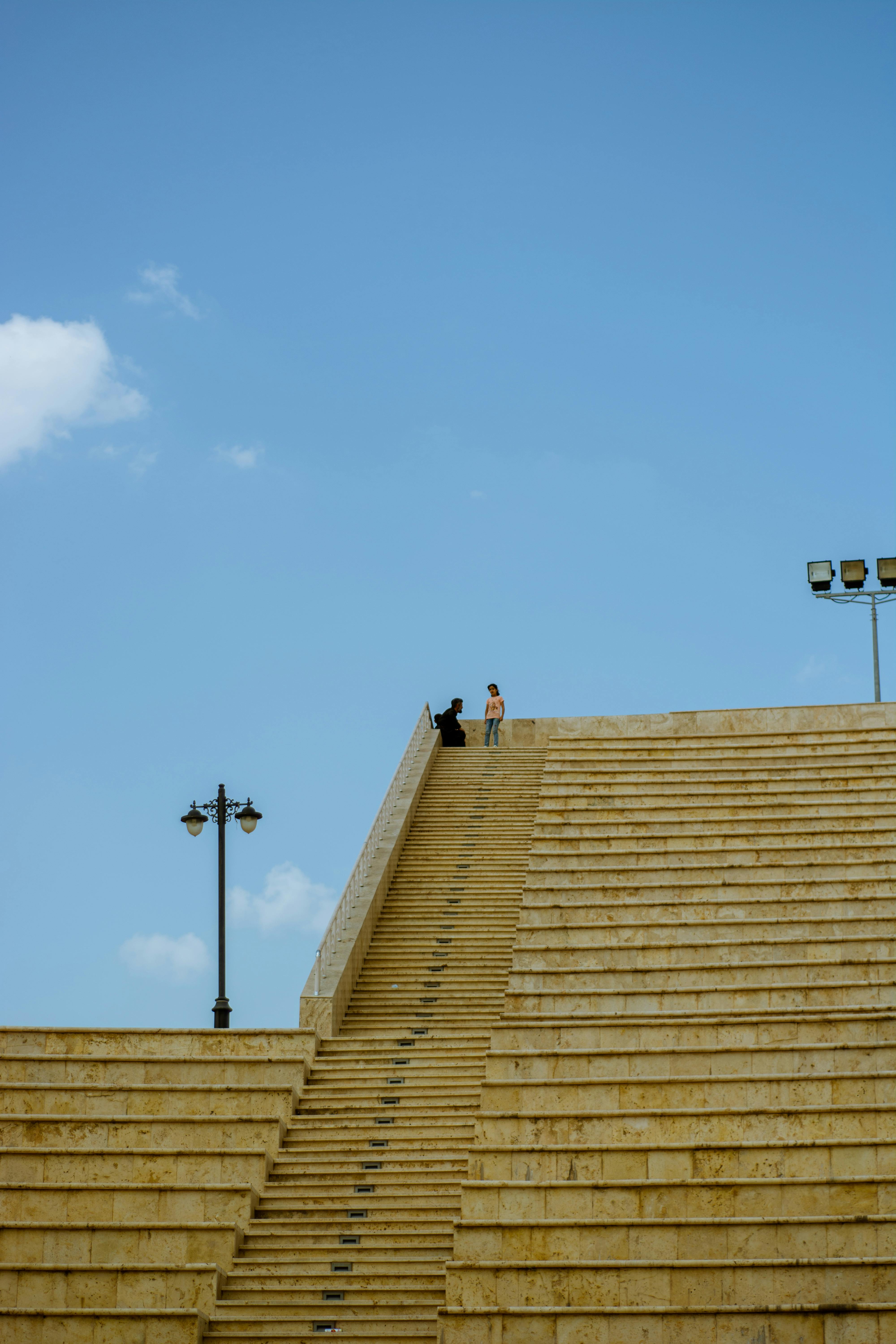People on Top of High Stand · Free Stock Photo