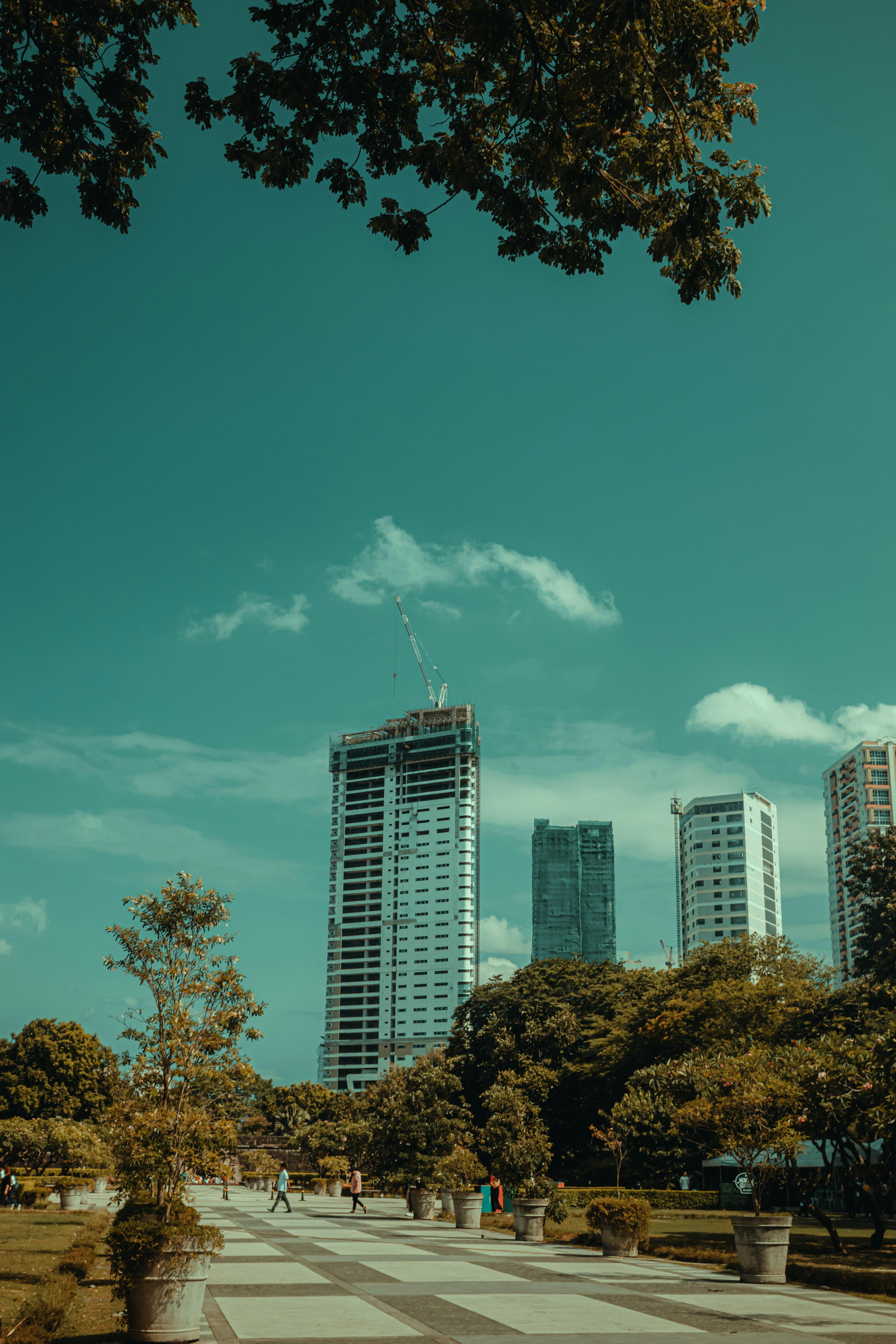 High Rise Building With Green Glass Windows · Free Stock Photo