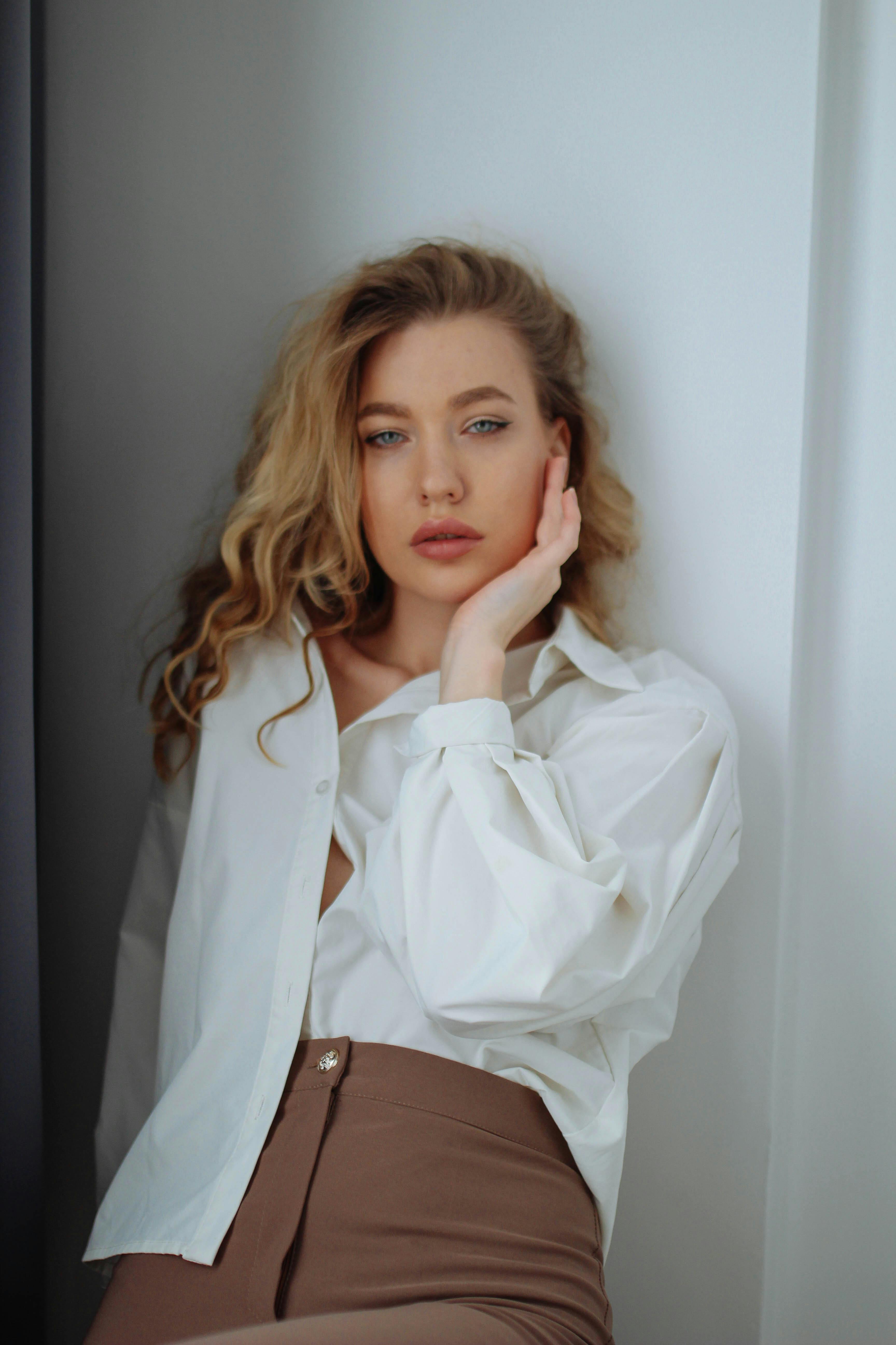 Model Leaning Against the Wall · Free Stock Photo