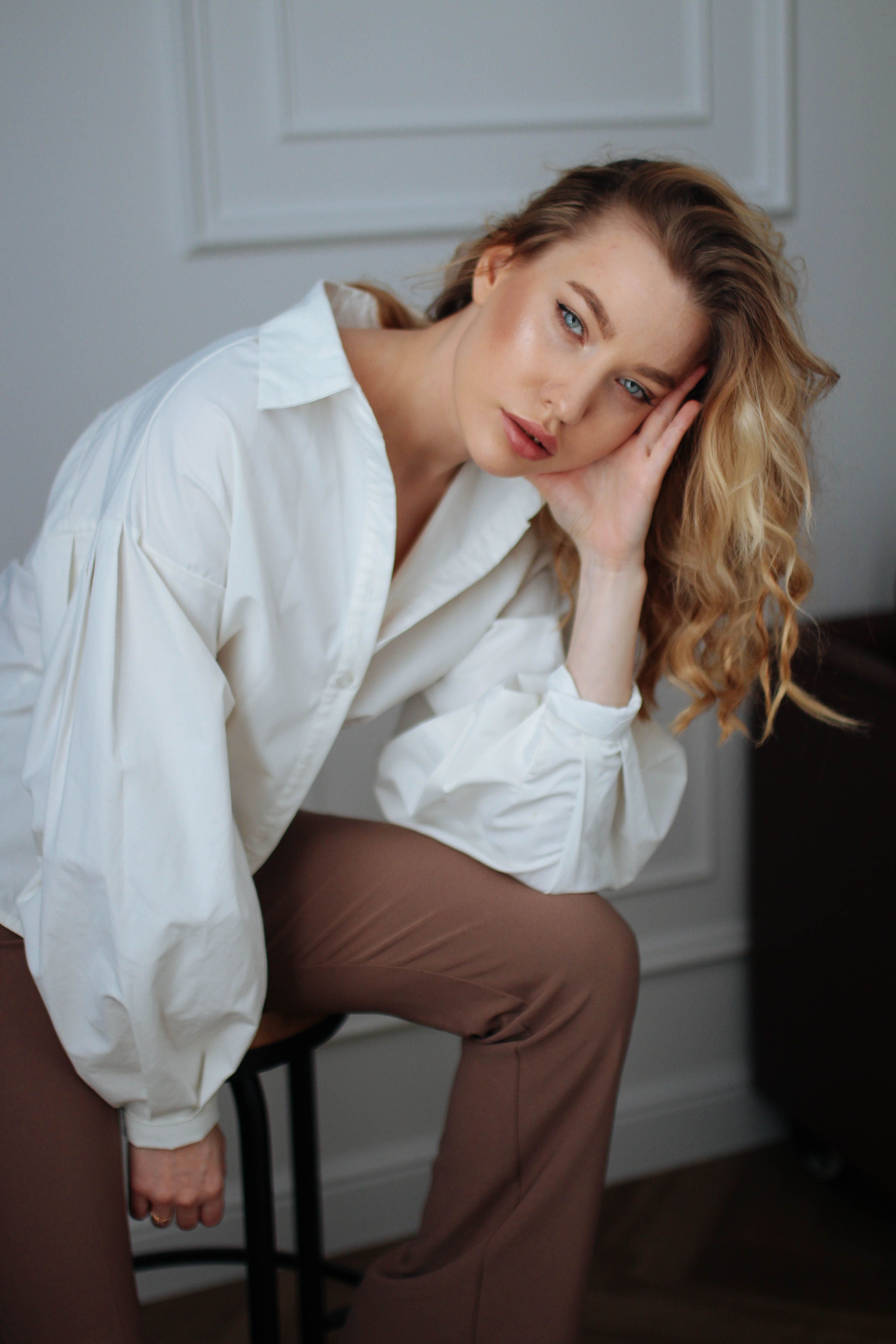Young Model with Her Head Resting on Her Hand · Free Stock Photo