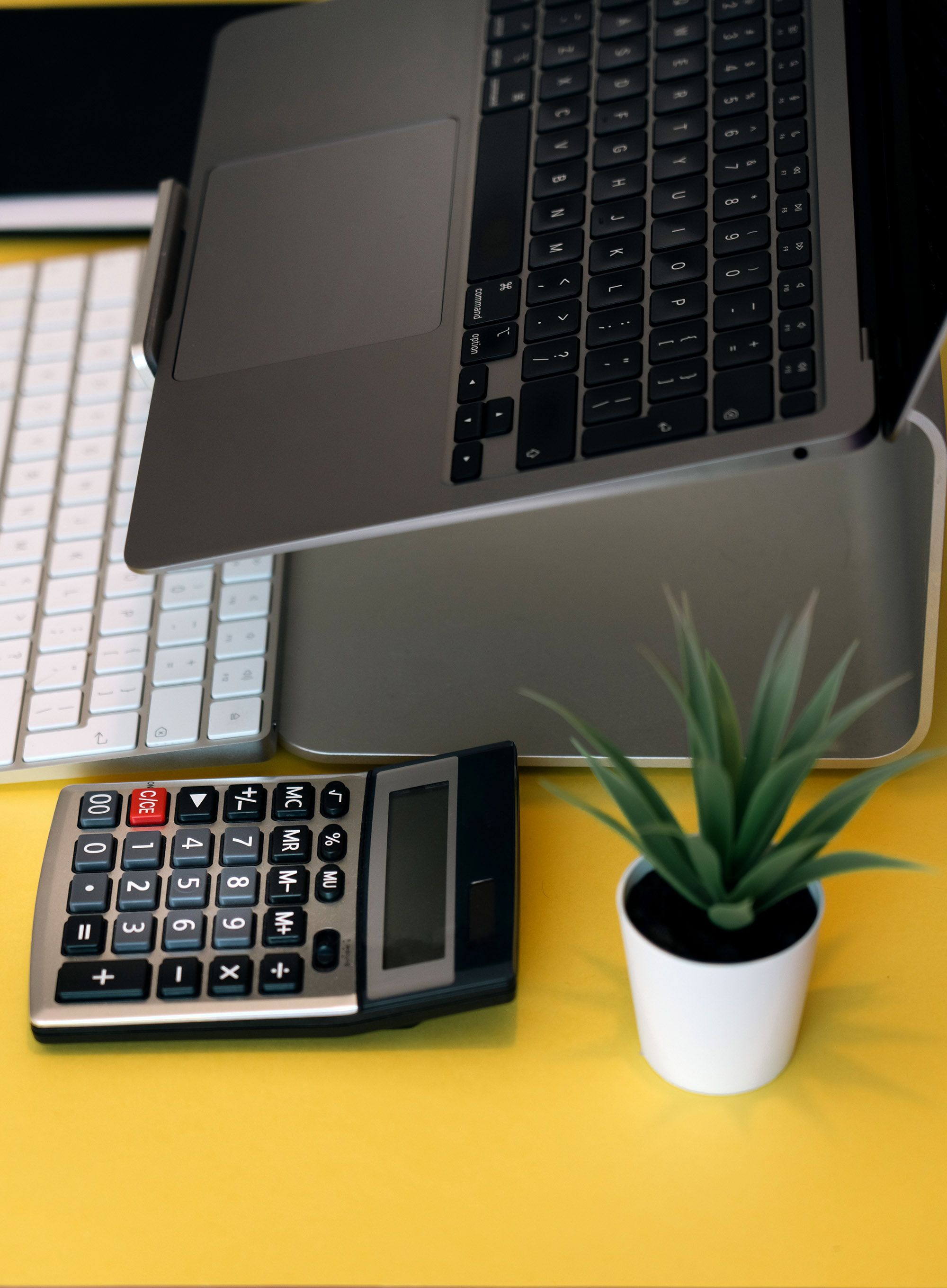 Calculator by Laptop · Free Stock Photo