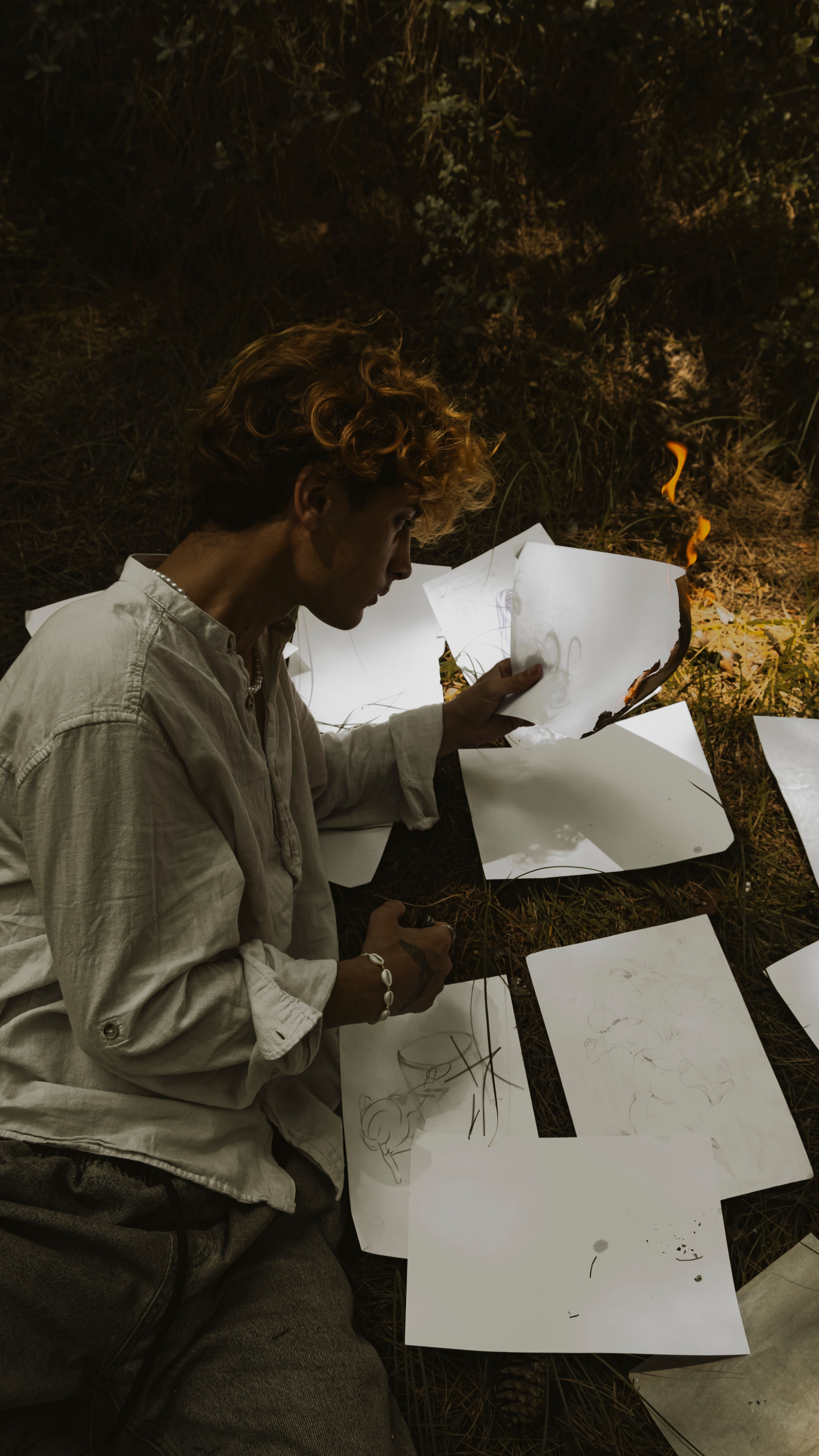Blonde Man Standing with Paper Sheets · Free Stock Photo