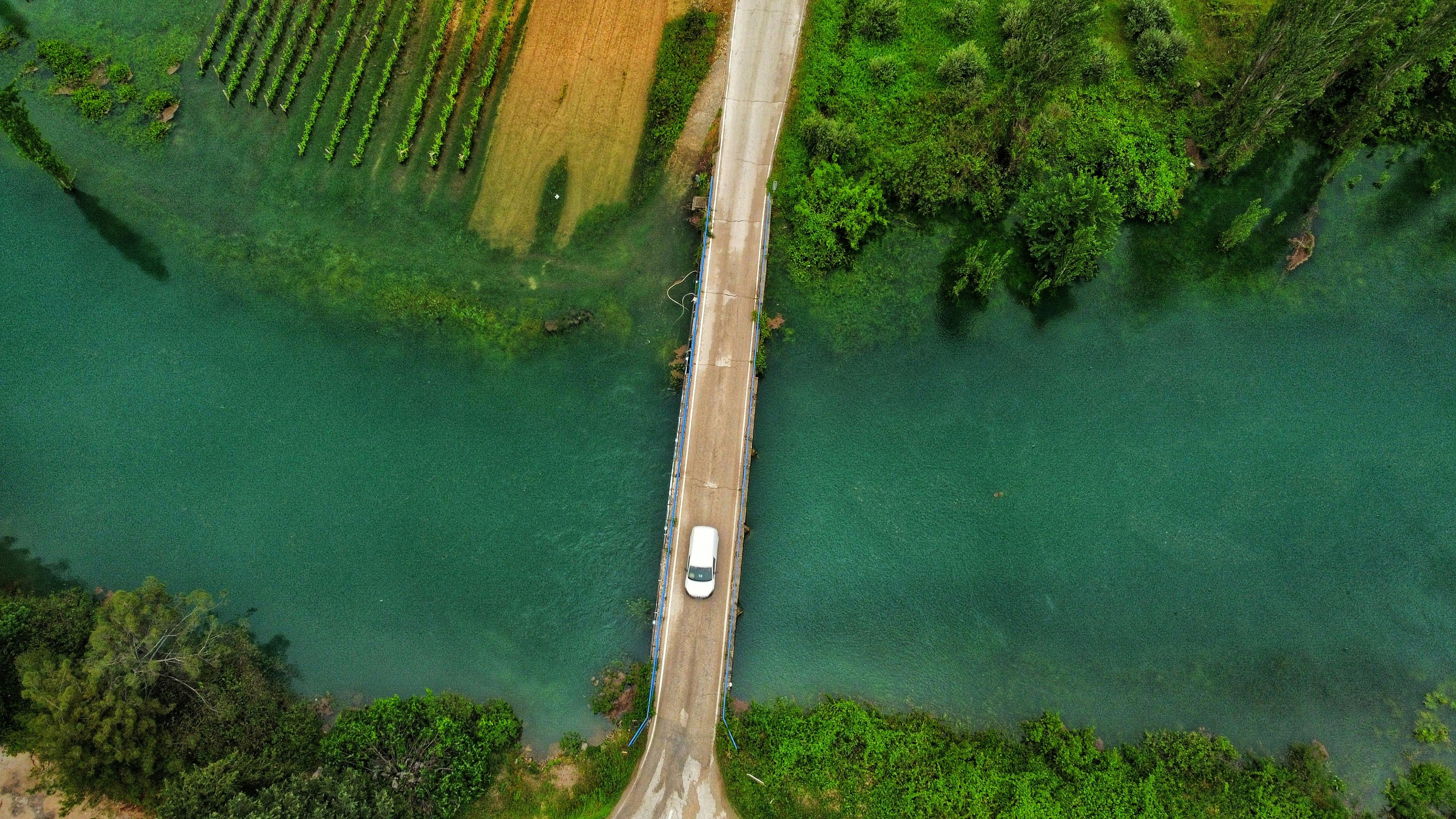 Car on Bridge on River · Free Stock Photo