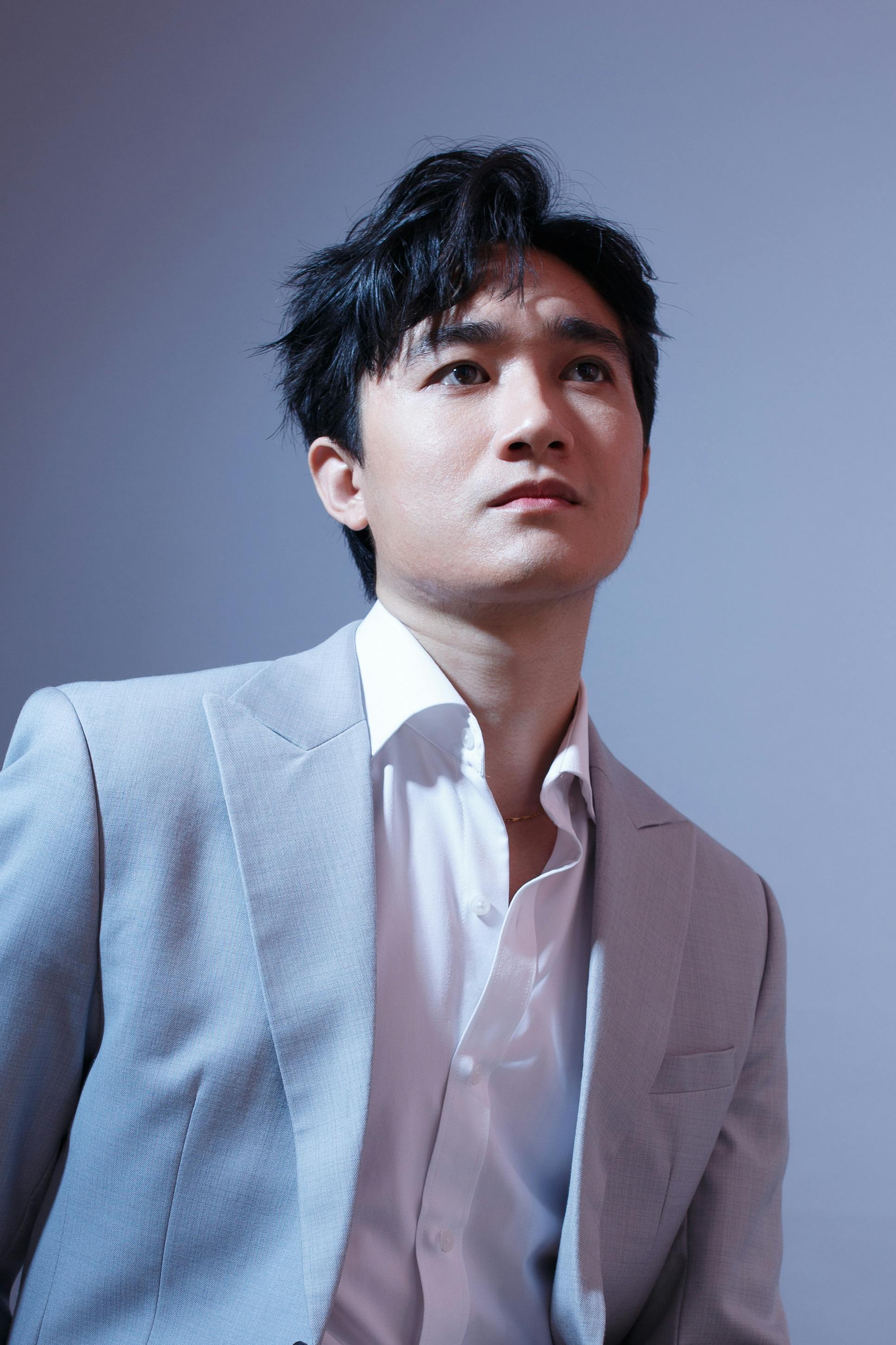 Man Sitting and Posing on Chair · Free Stock Photo