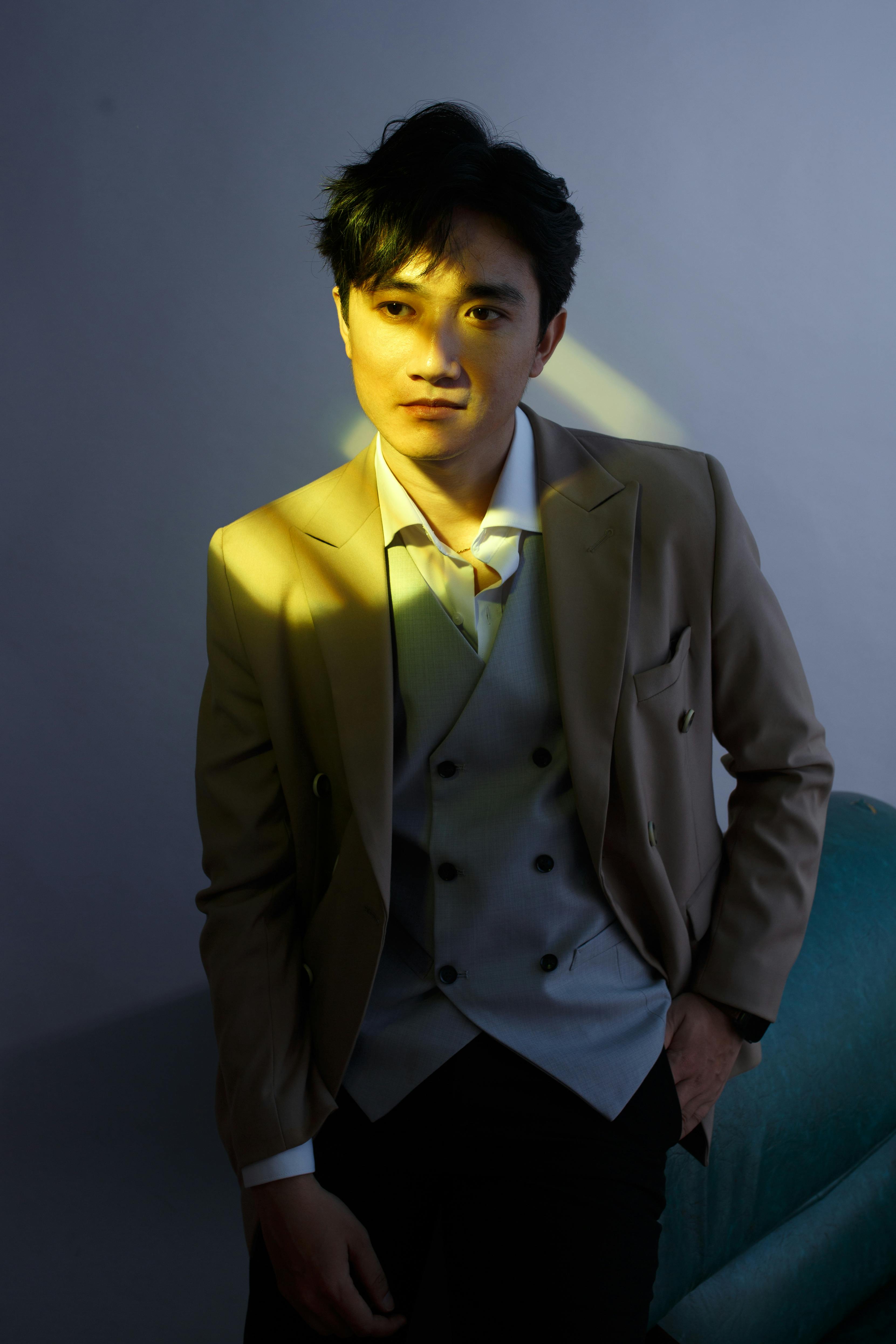 Man in Suit Posing · Free Stock Photo