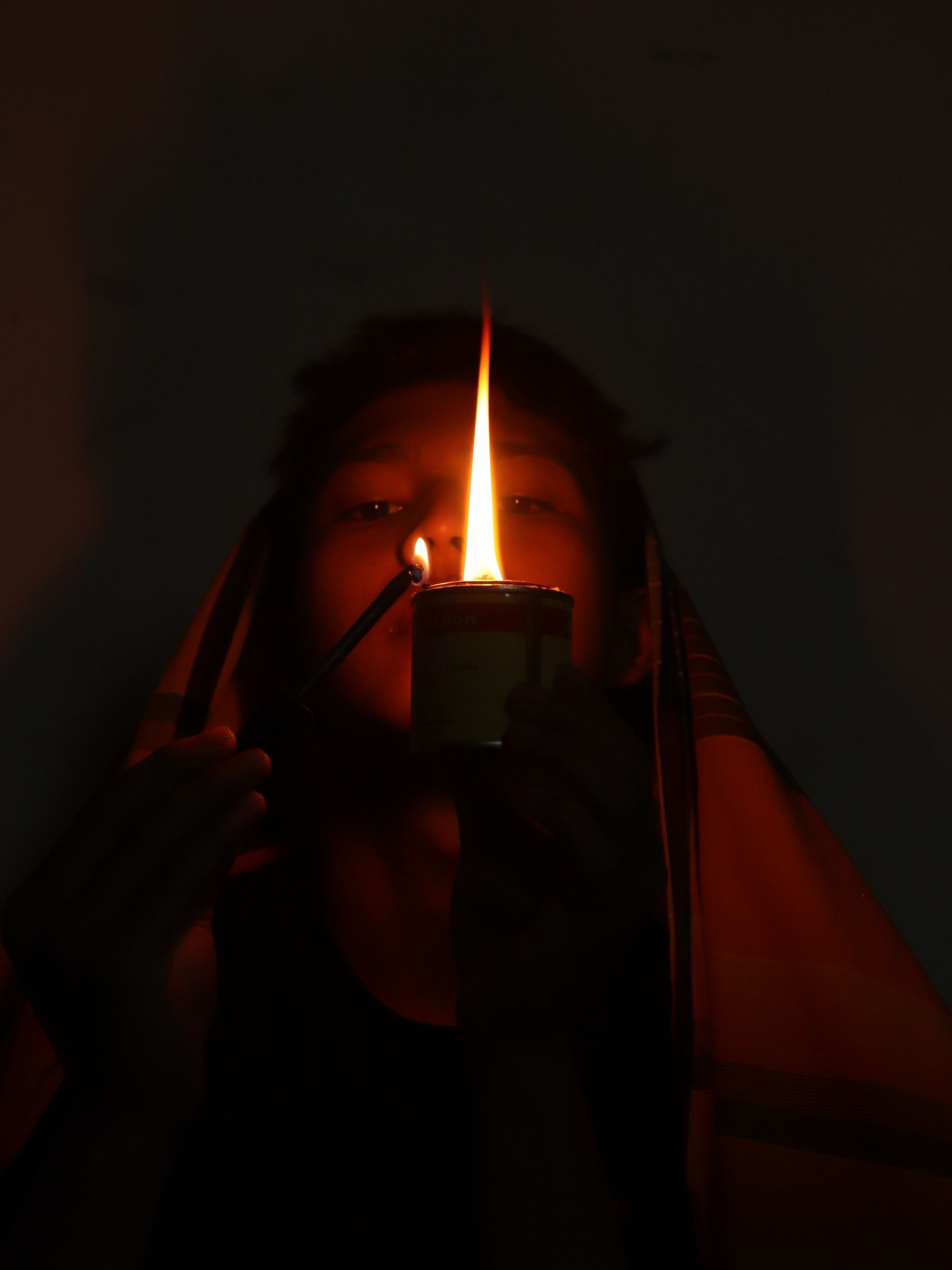 Woman Face behind Wax Candle · Free Stock Photo