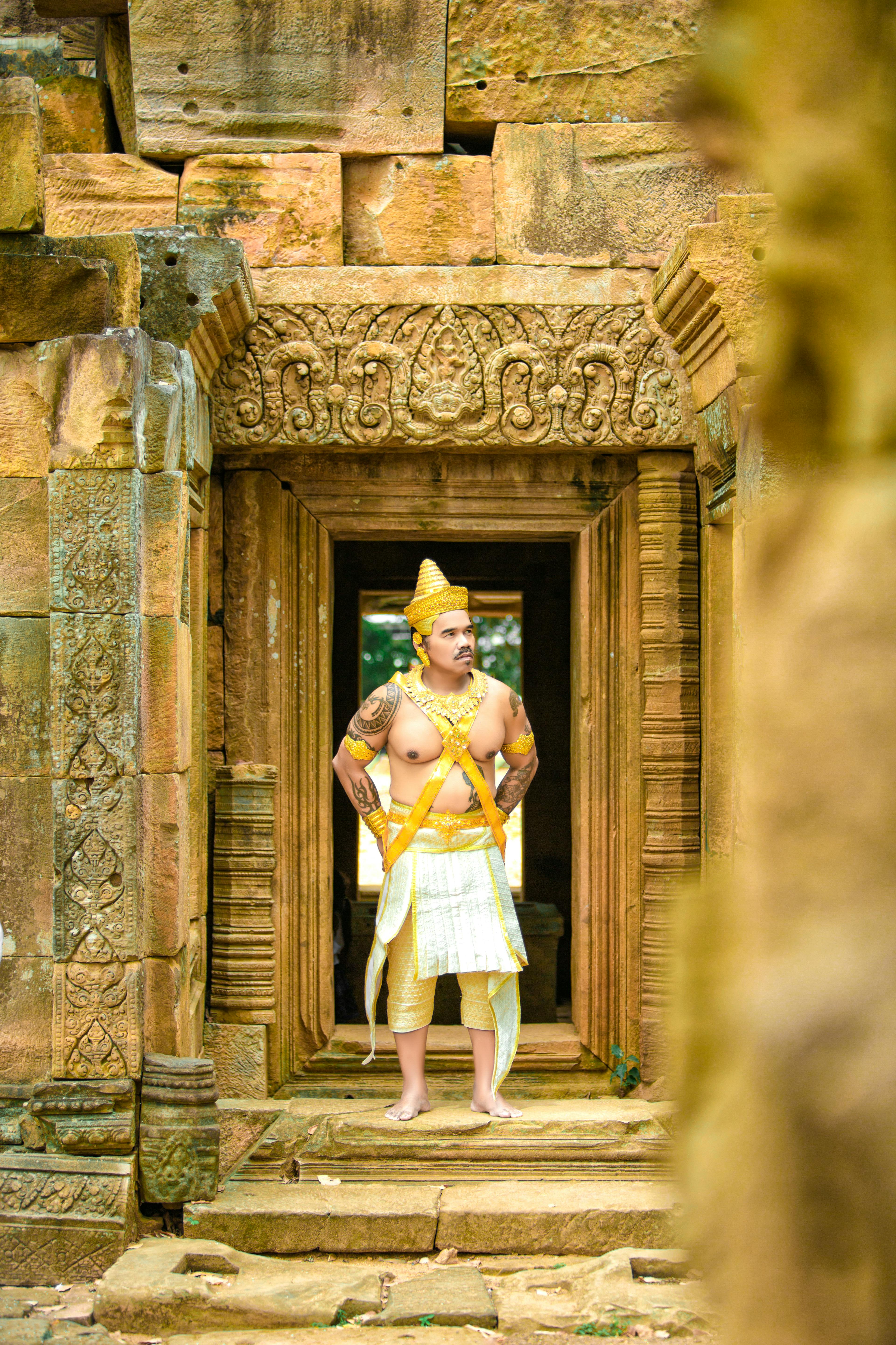 Man in Traditional Clothing Standing in the Doorway of the Temple ...