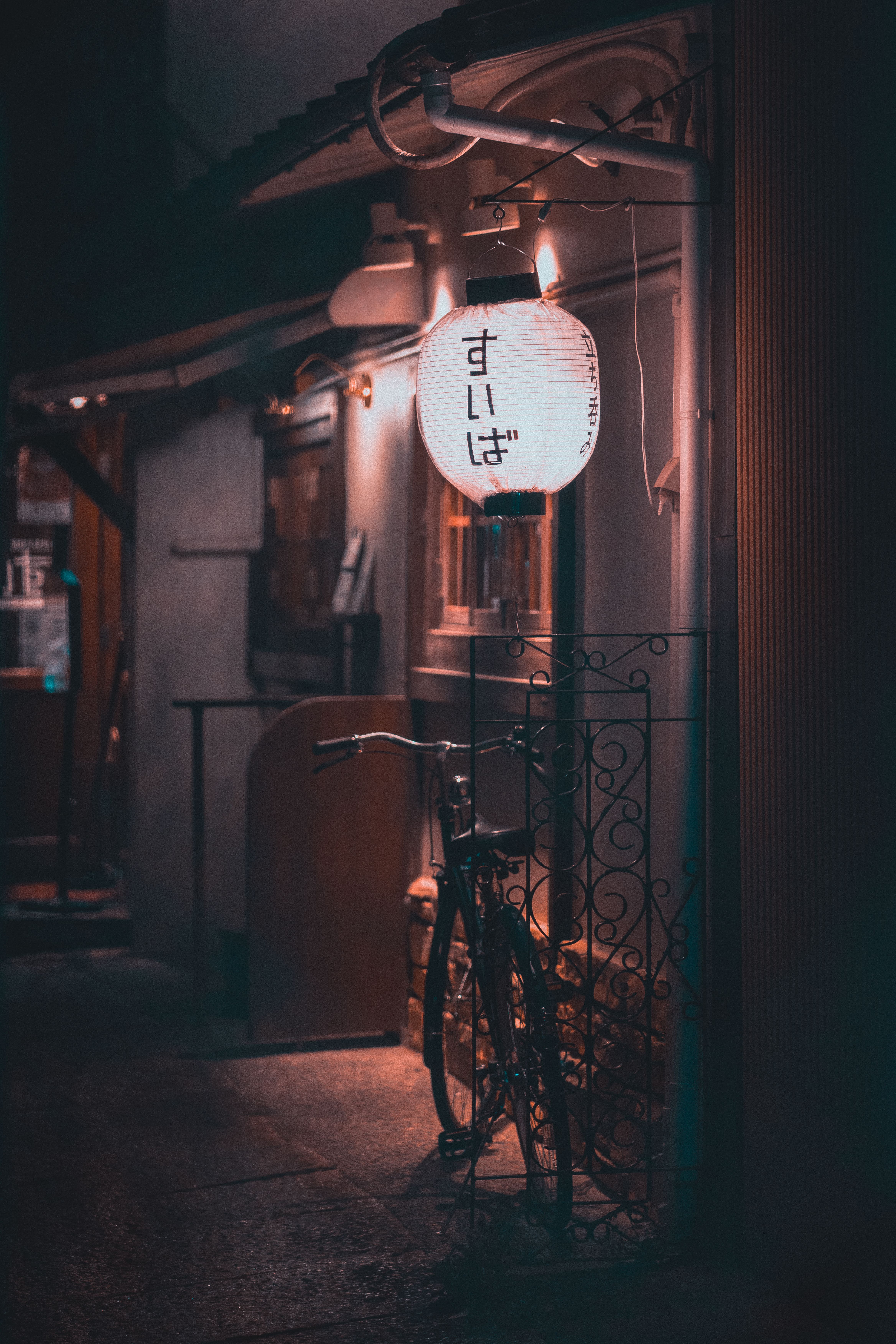 Japanese lantern with bicycle on the street · Free Stock Photo