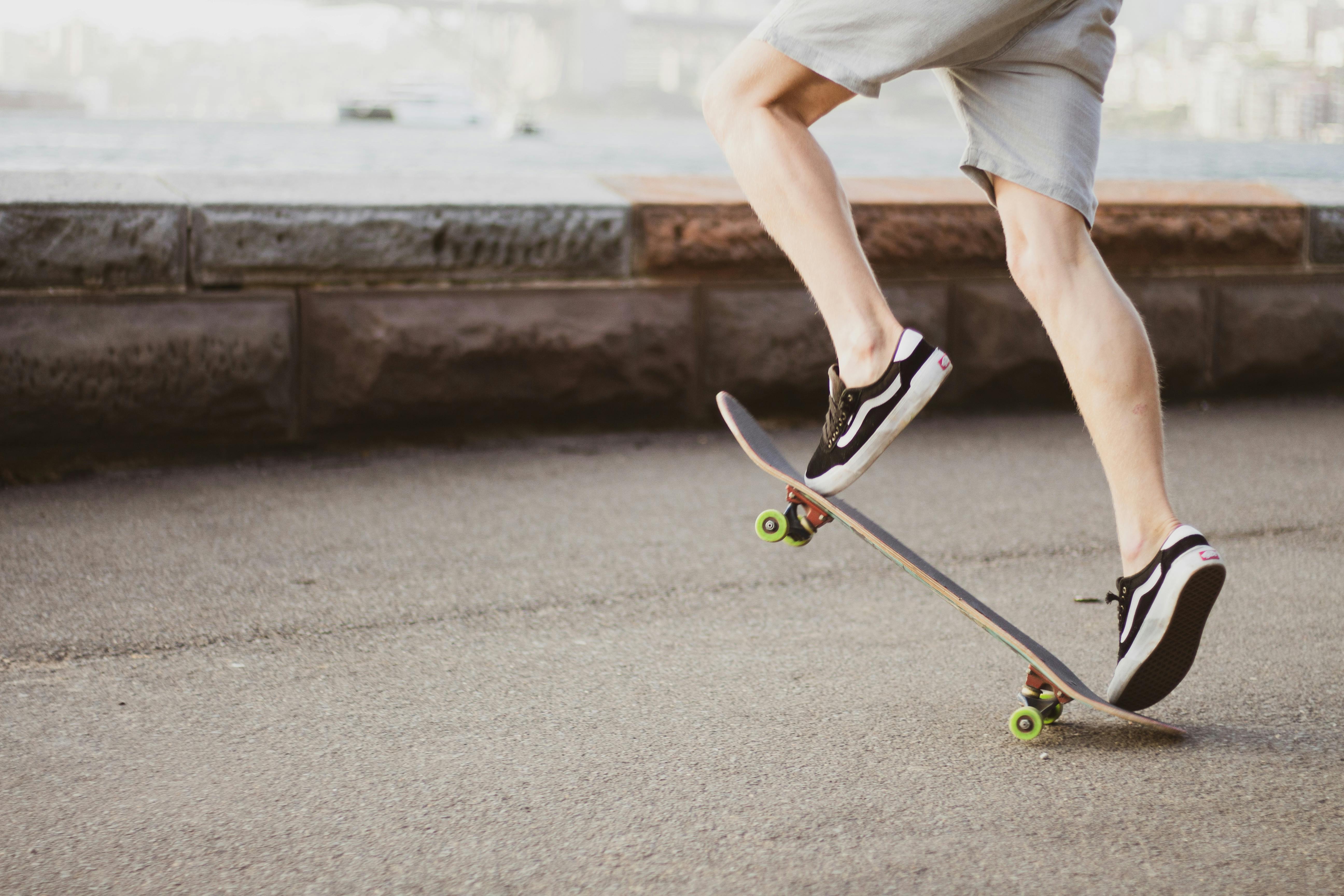Man freeriding on Longboard · Free Stock Photo