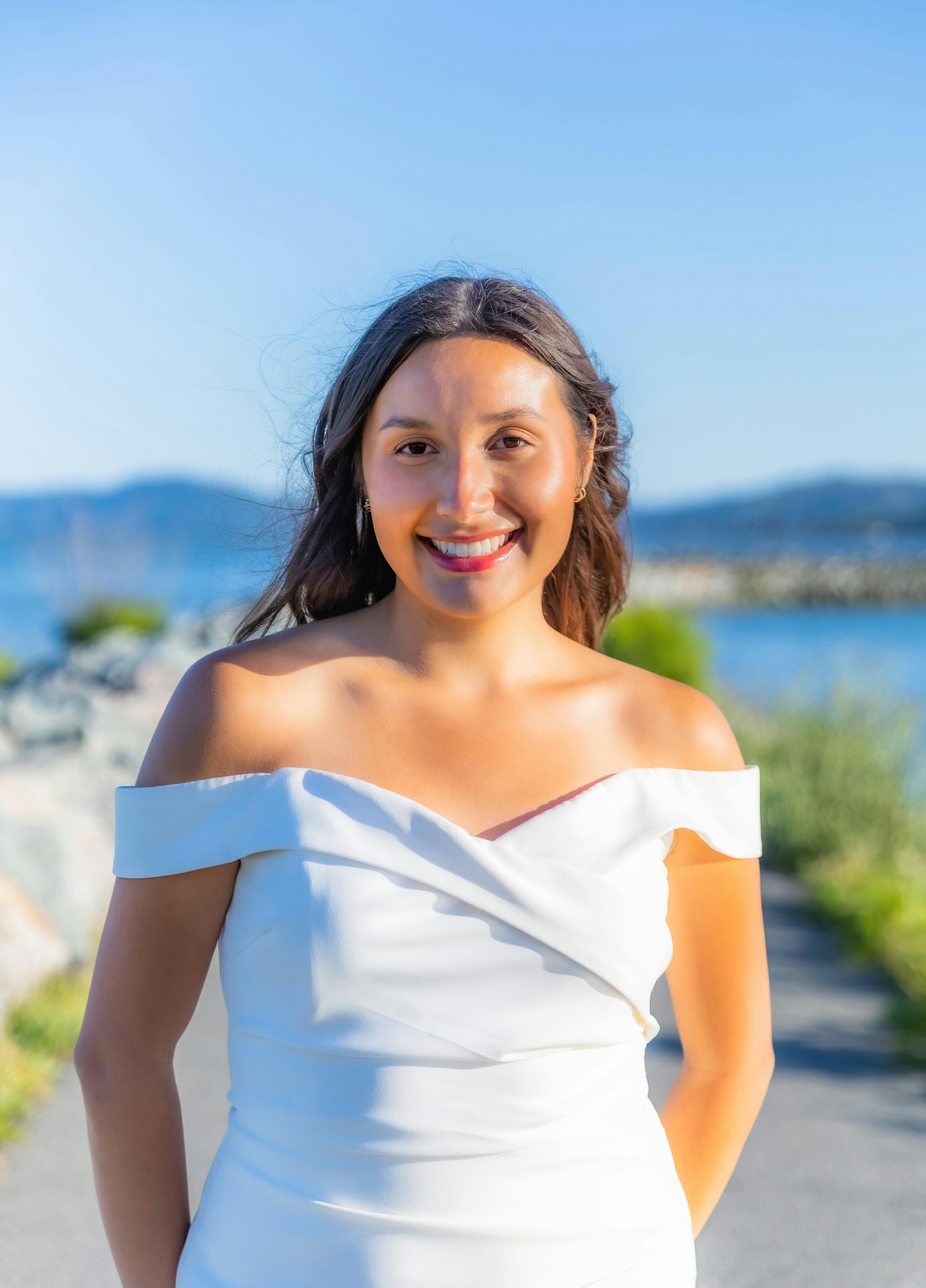 Portrait of Smiling Woman in White Clothes · Free Stock Photo