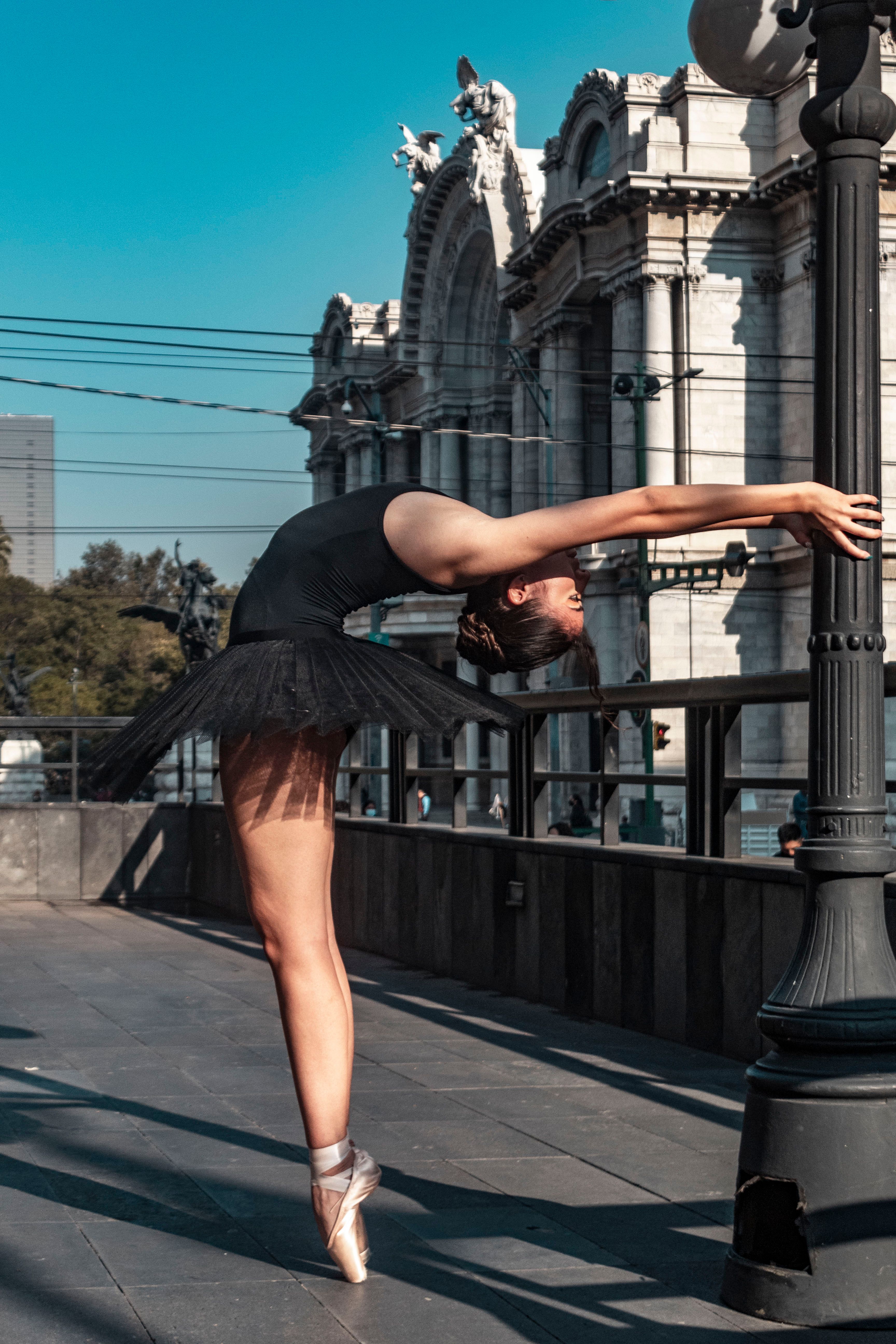 Woman Dancing Ballet on City Street · Free Stock Photo