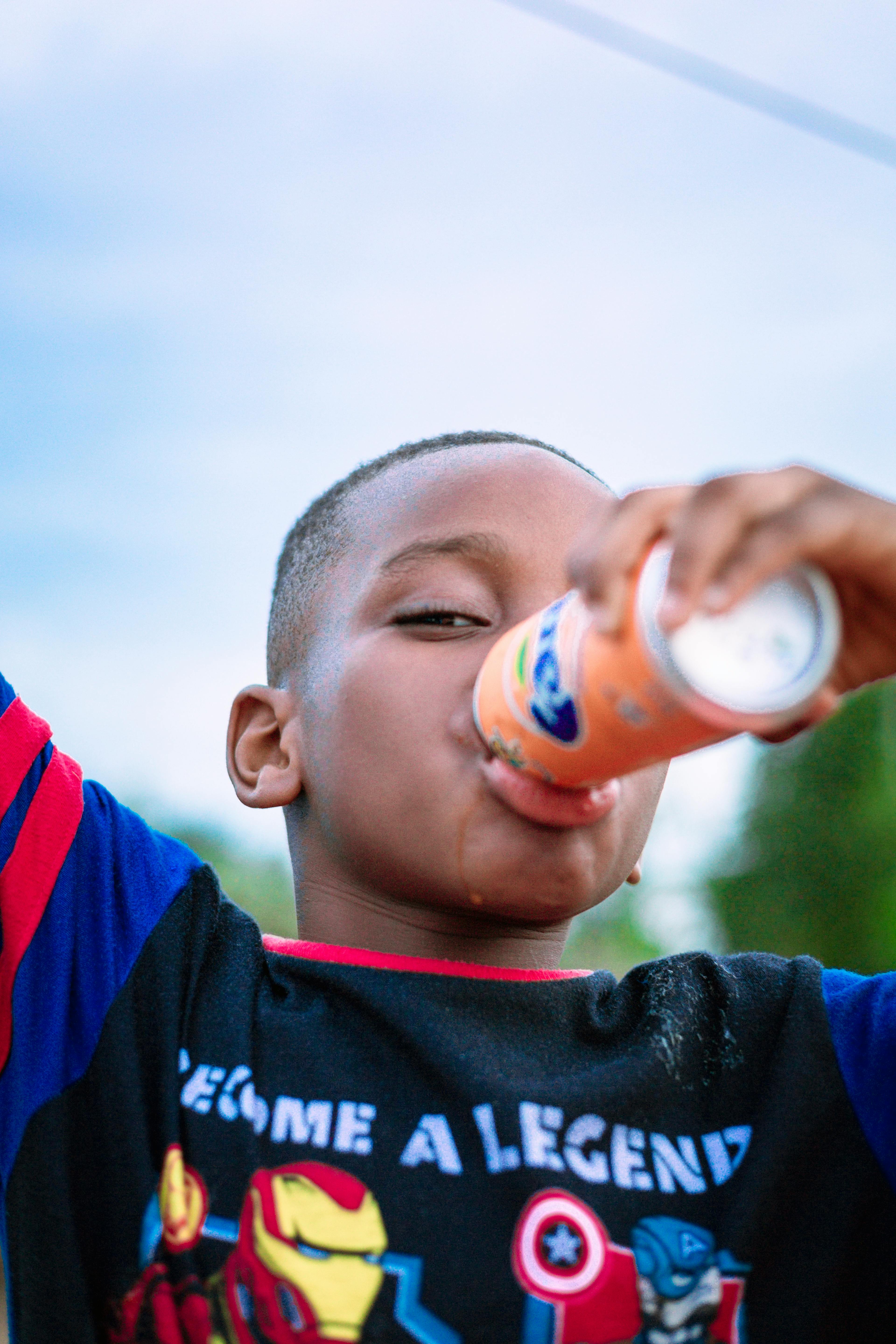 Boy Drinking Fanta · Free Stock Photo