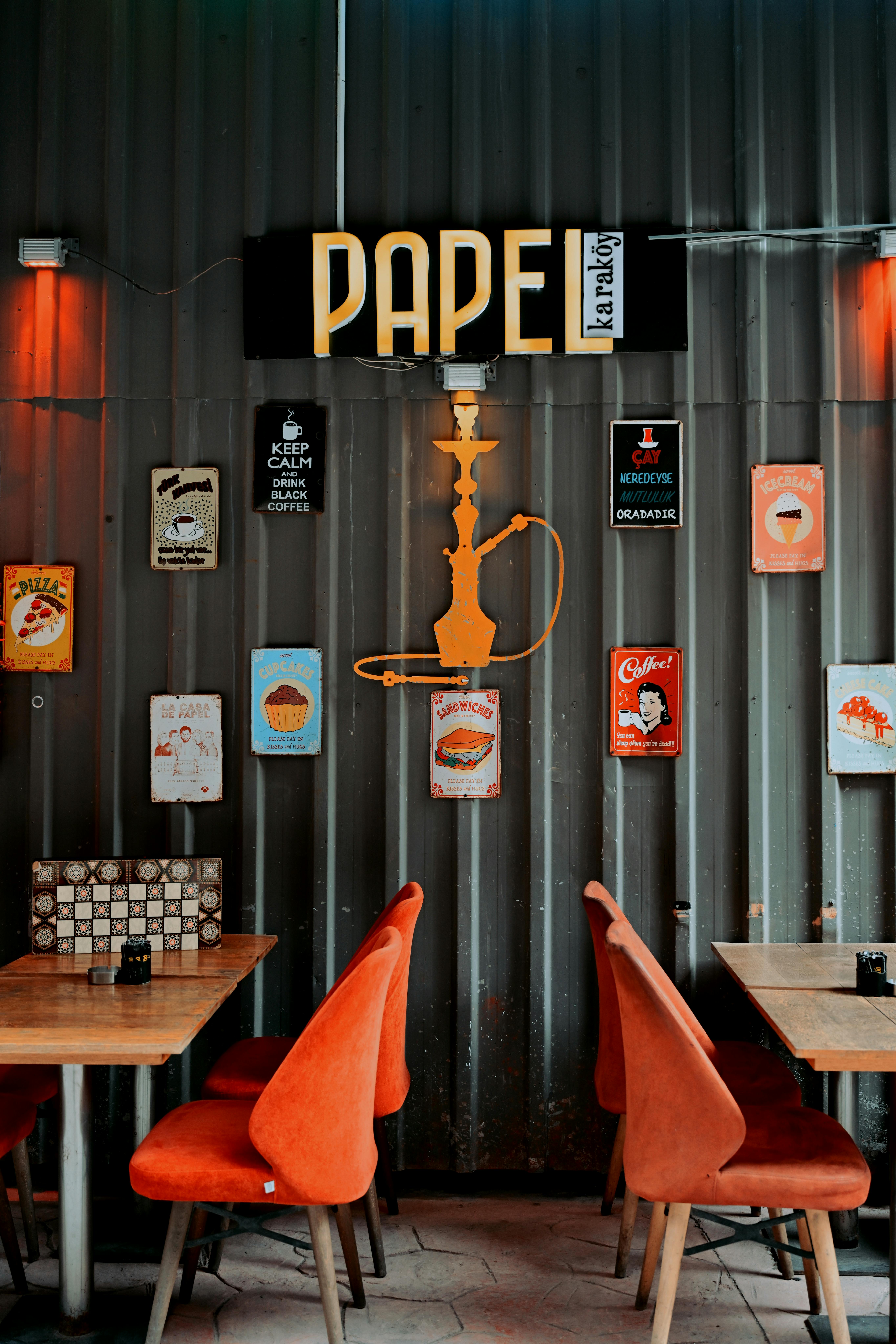 Various Signs Hanging on a Wall inside the Papel Karakoy Cafe · Free ...