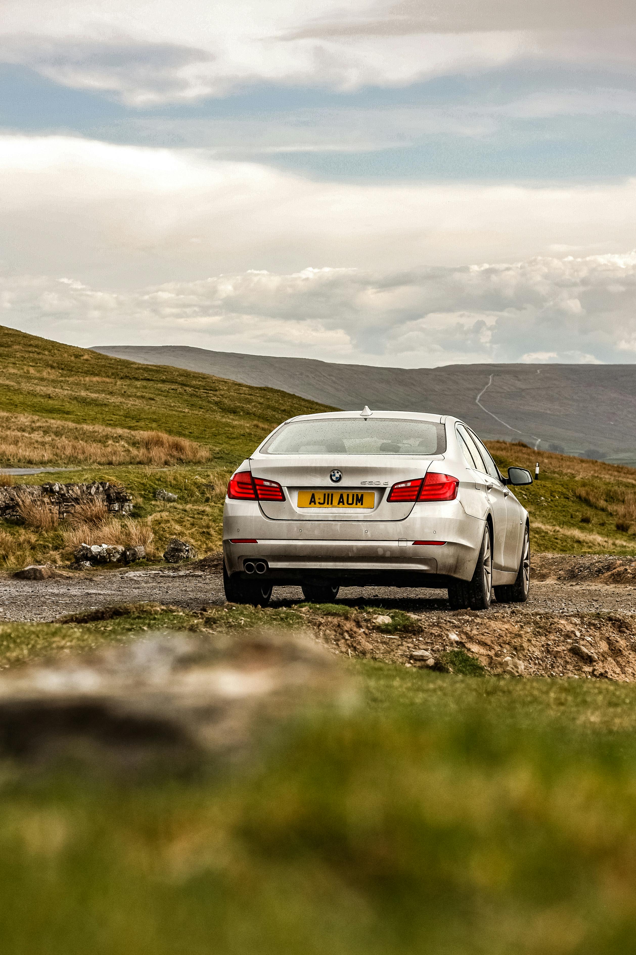Back View of A Silver BMW F10 · Free Stock Photo