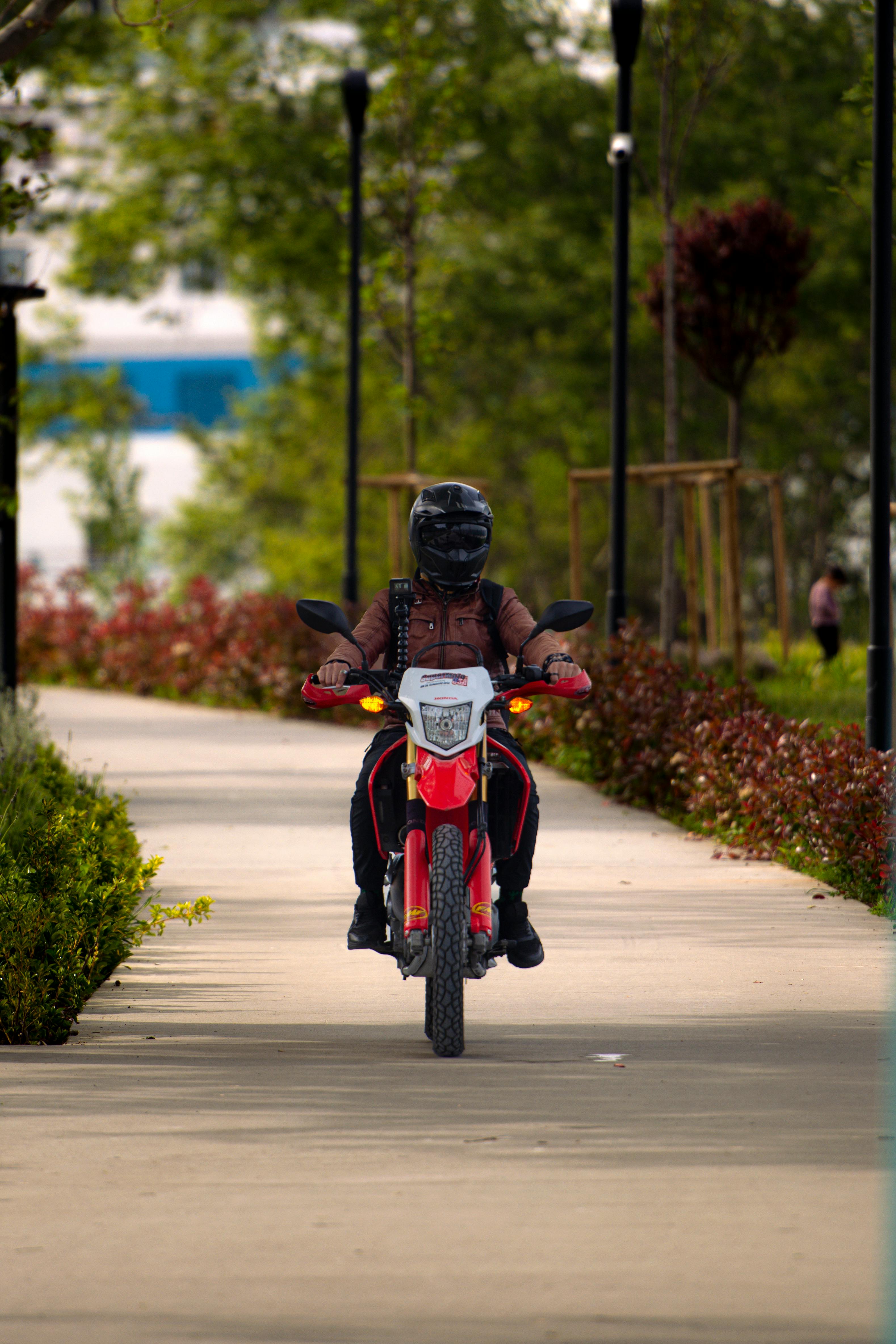 Man Driving a Riding Mower · Free Stock Photo