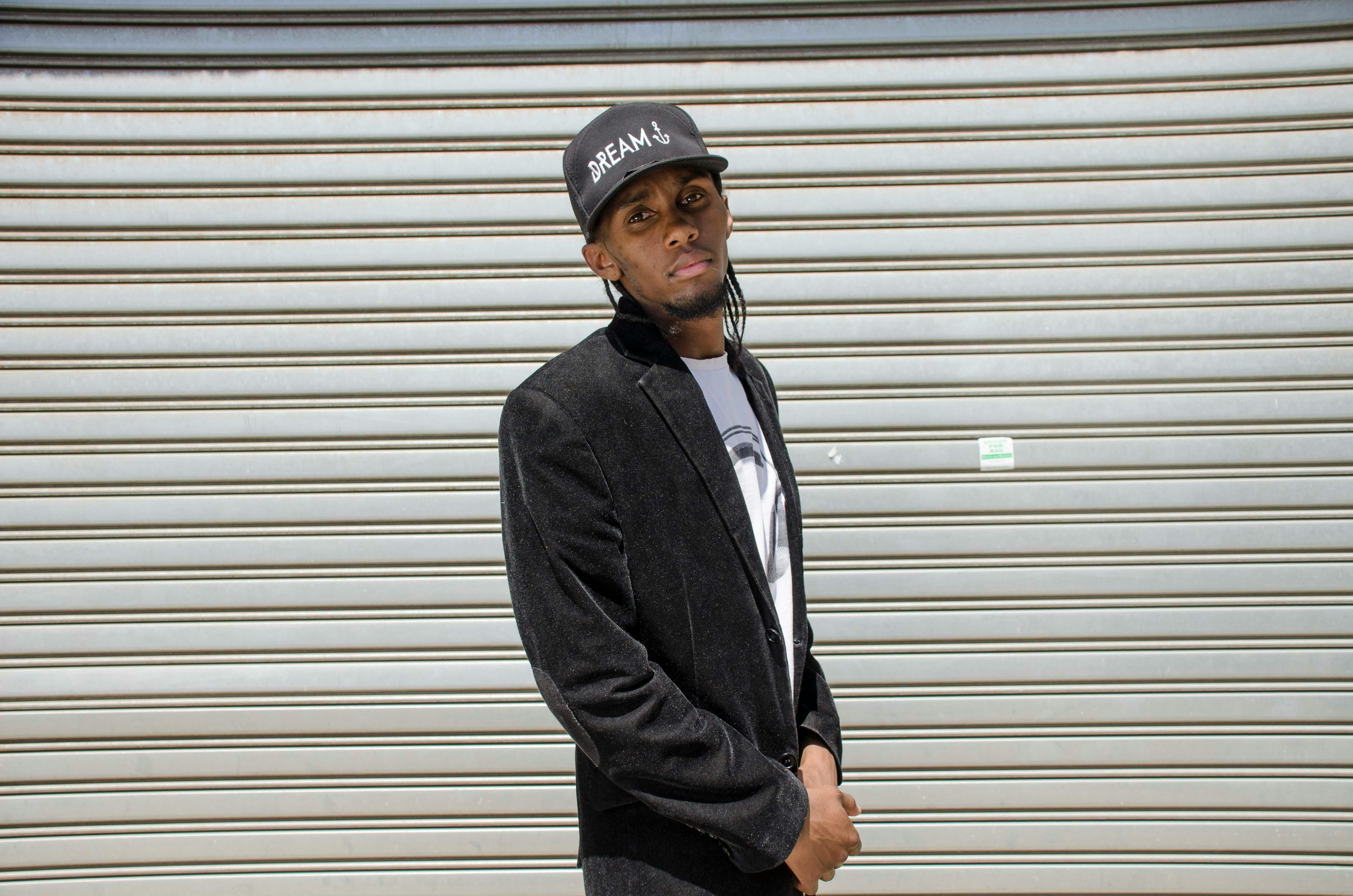 Photo of Man Wearing Black Cap · Free Stock Photo