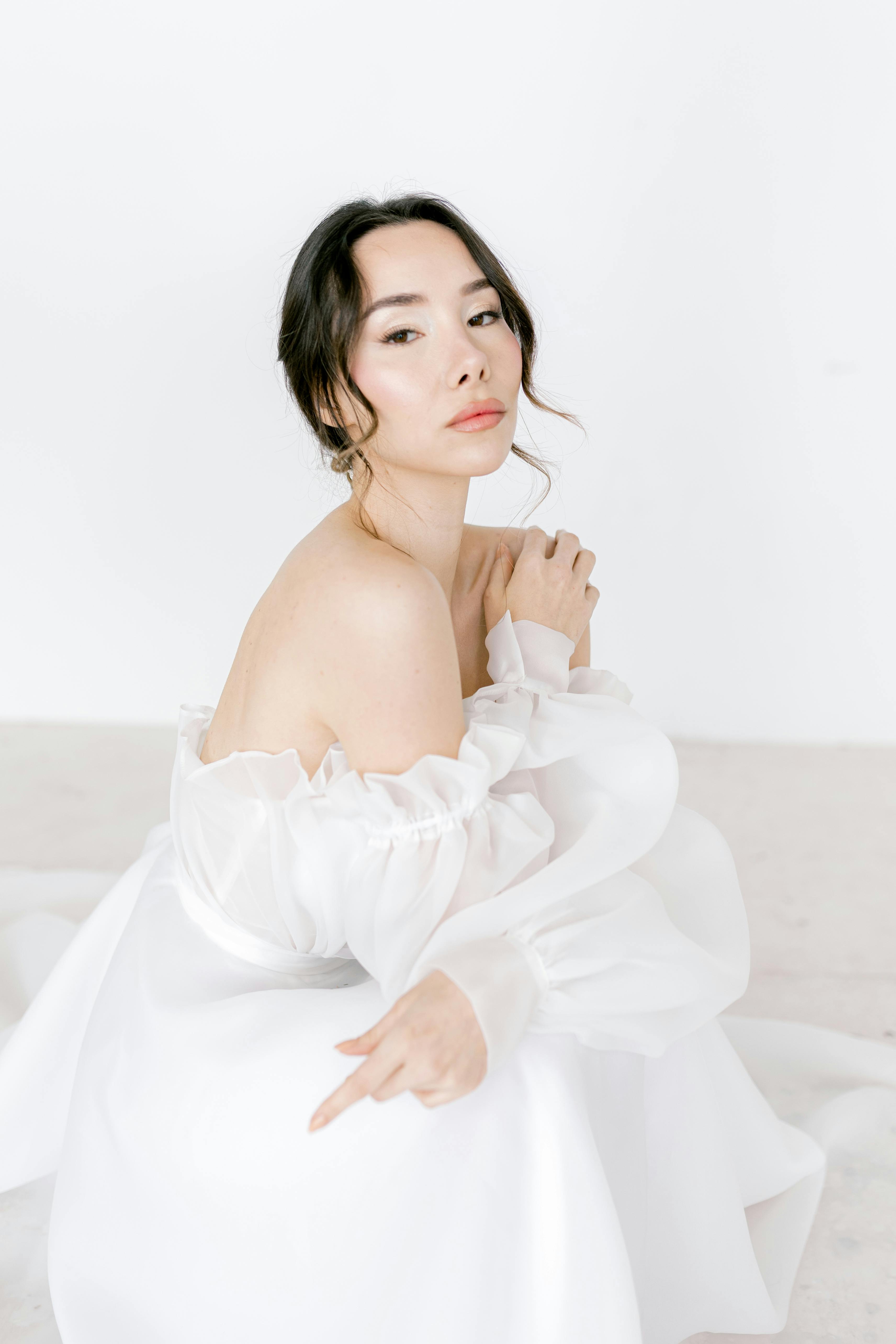 Portrait of a Woman in a White Dress · Free Stock Photo