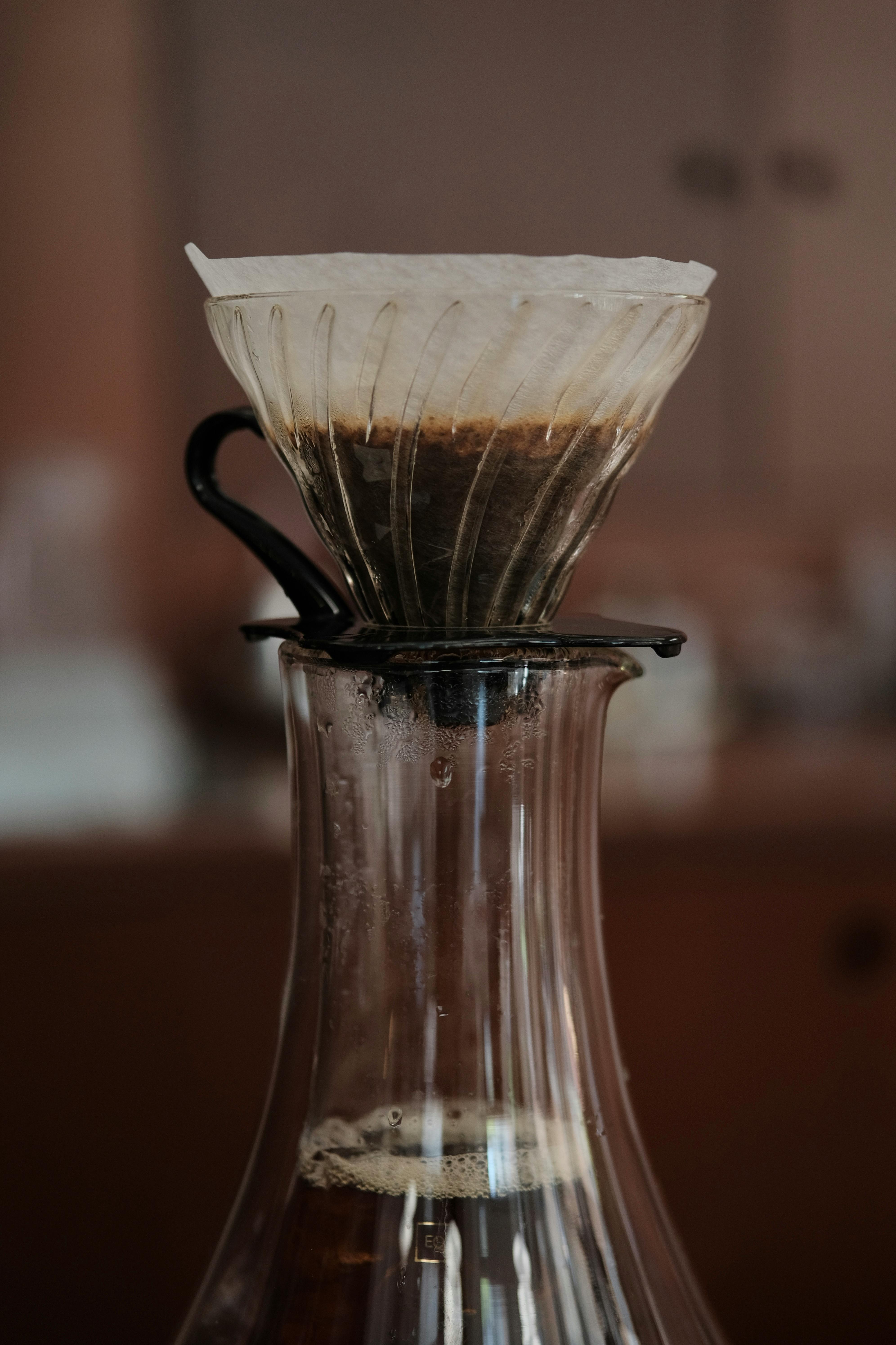 Close-up of Coffee Straining through the Filter · Free Stock Photo