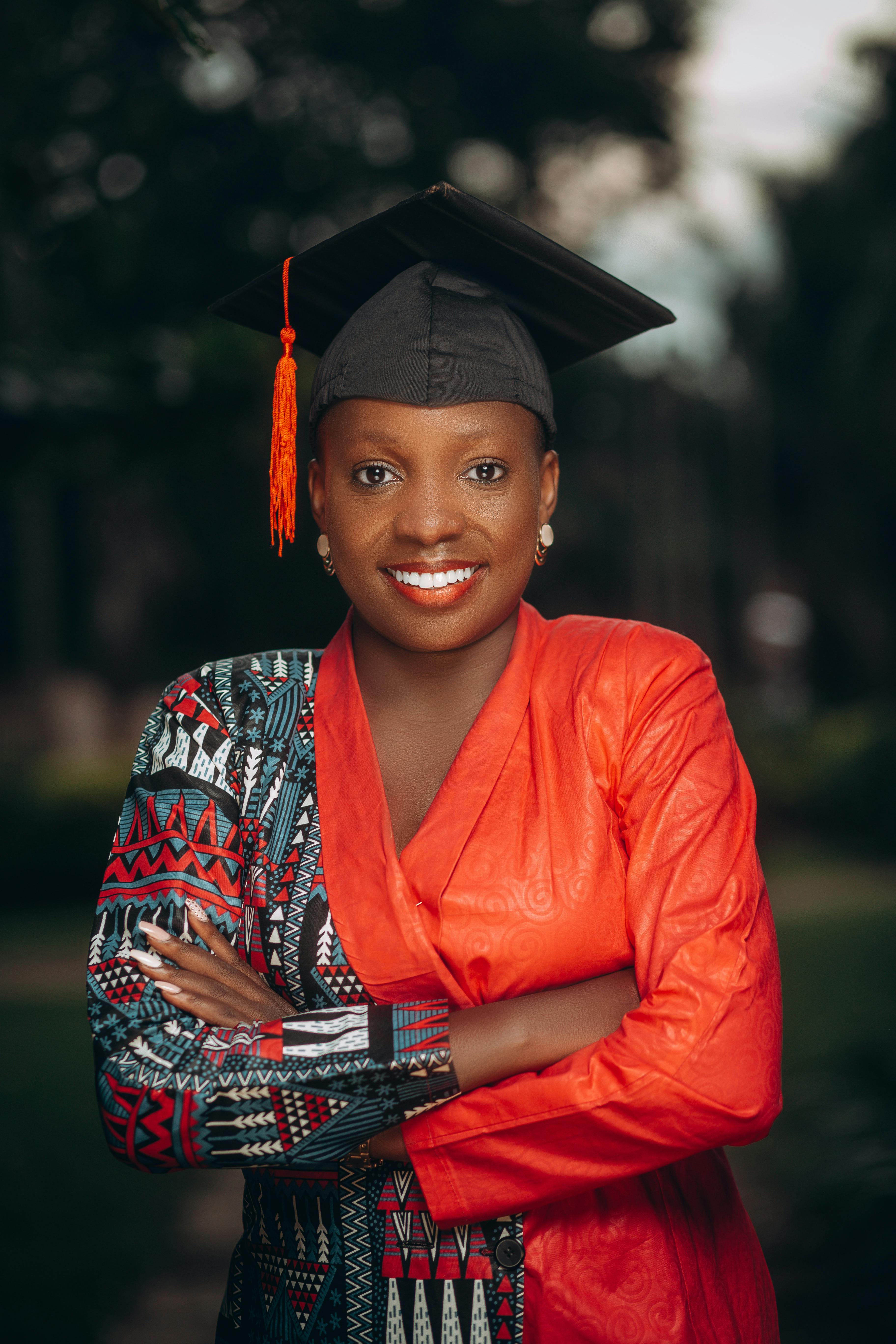 Portrait of a Girl in a Graduation Gown · Free Stock Photo