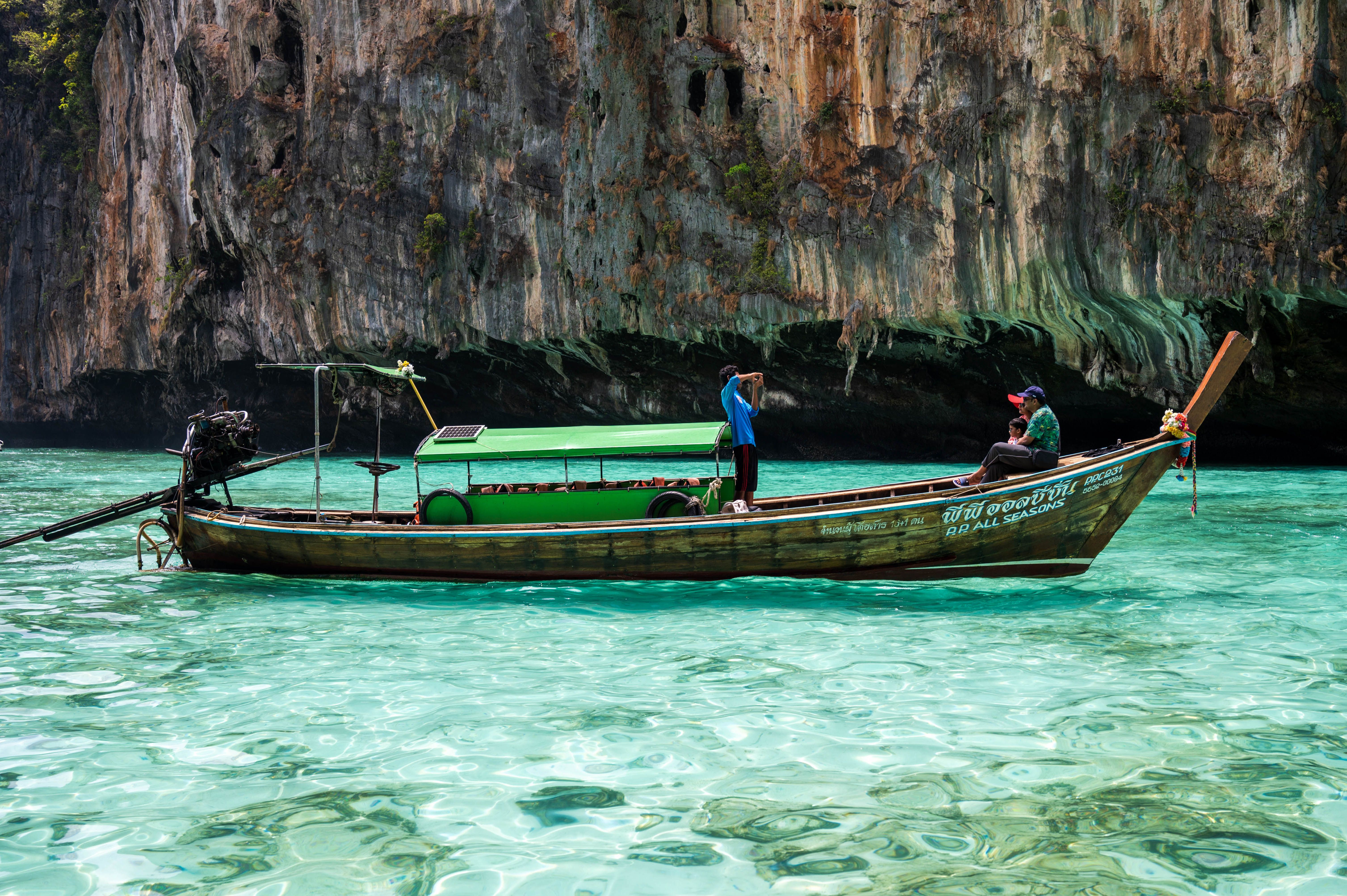 A Boat by a Cliff · Free Stock Photo