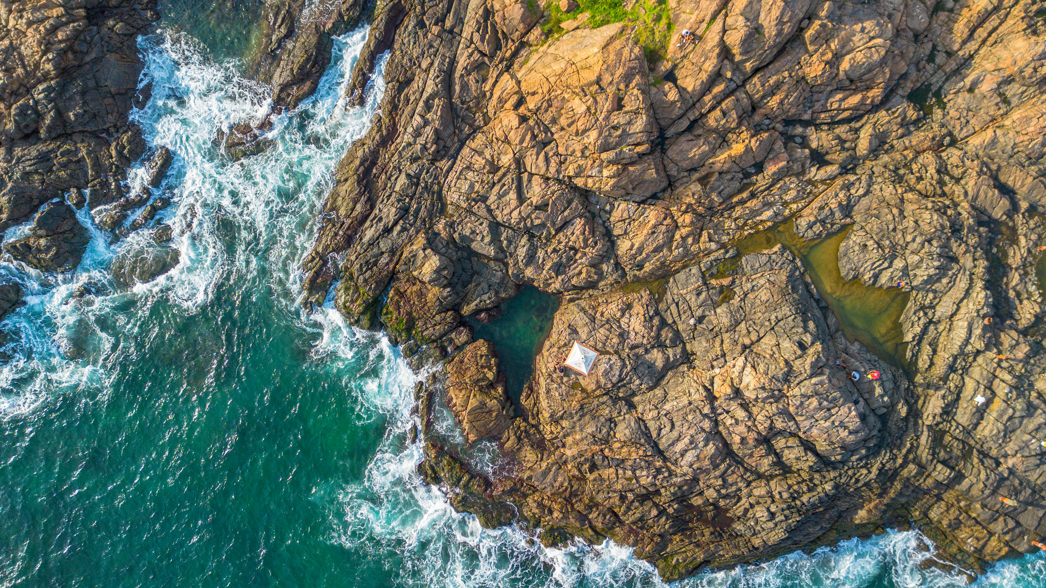 Aerial View of Rocky Coastline · Free Stock Photo