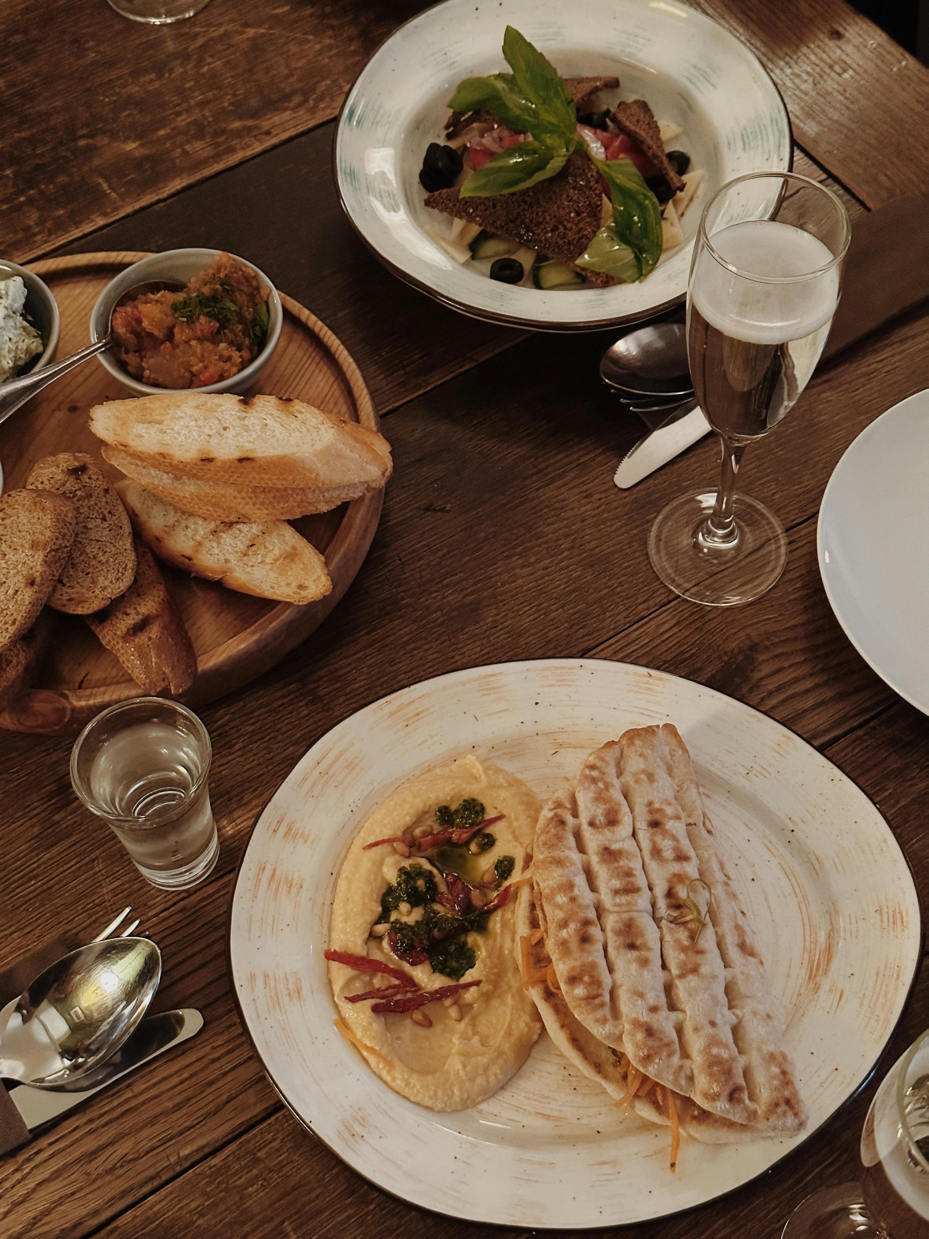 Table in Restaurant with Meals · Free Stock Photo