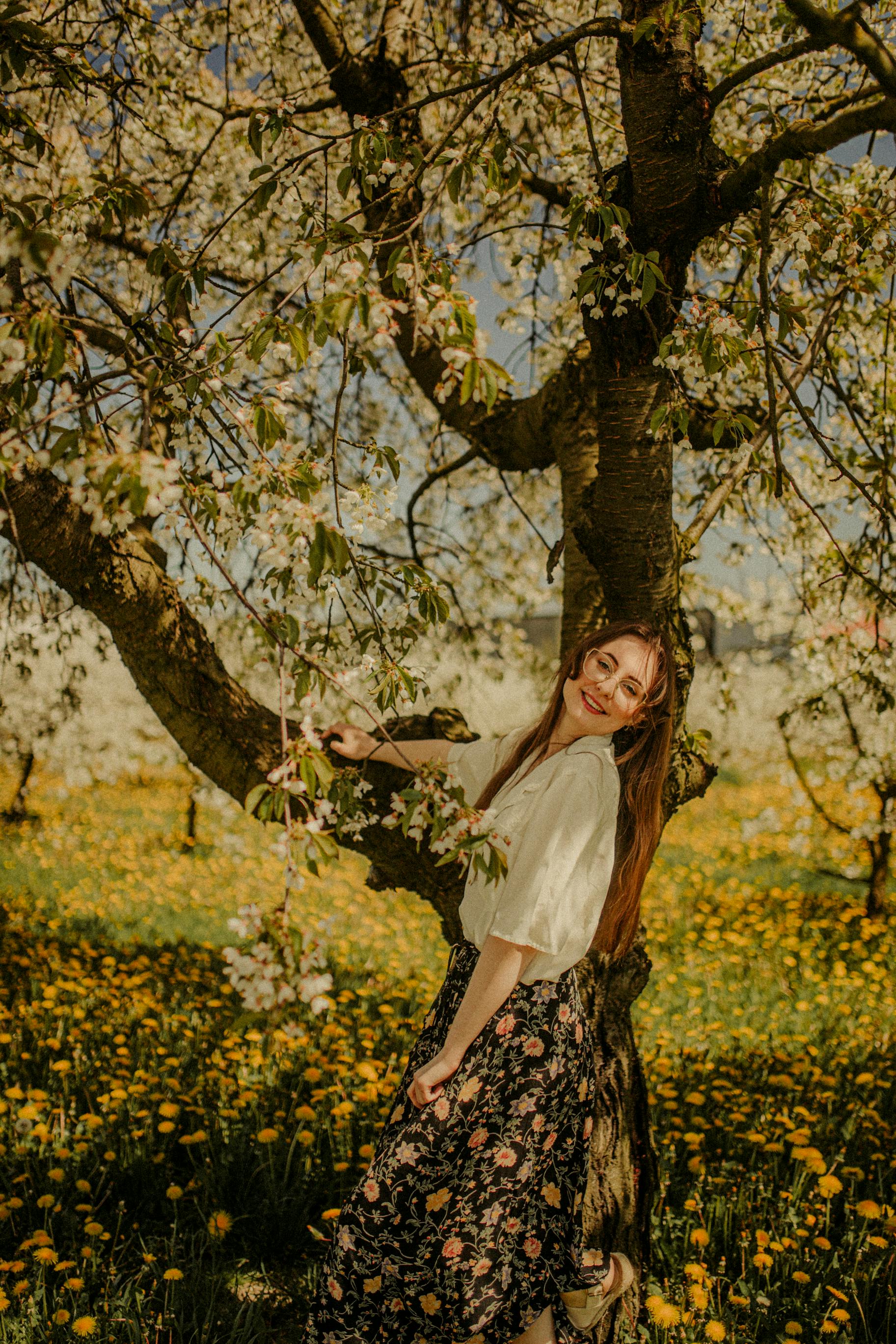 Woman Standing under Blossoming Tree · Free Stock Photo