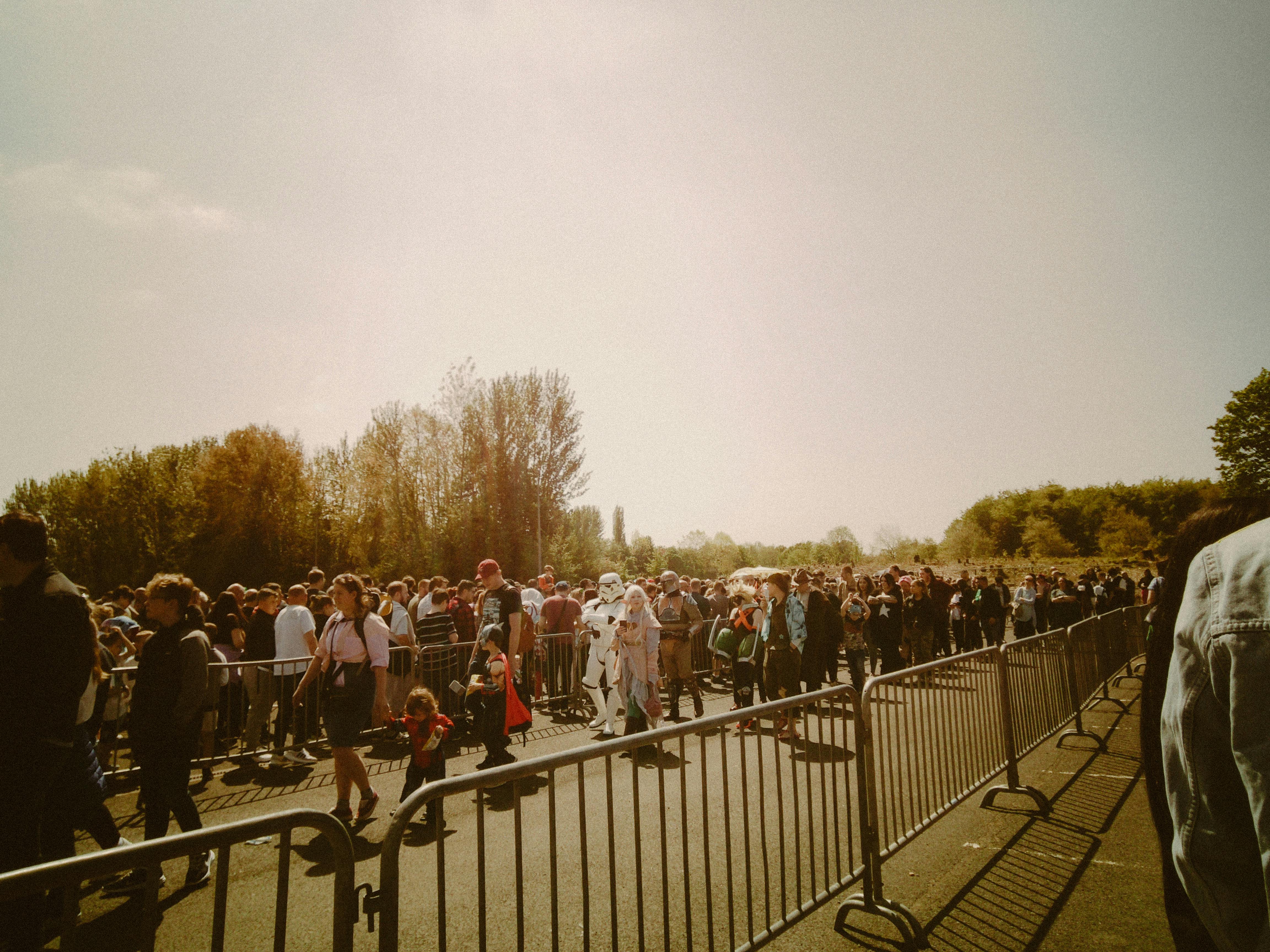 Group of People Walking in a Parade · Free Stock Photo