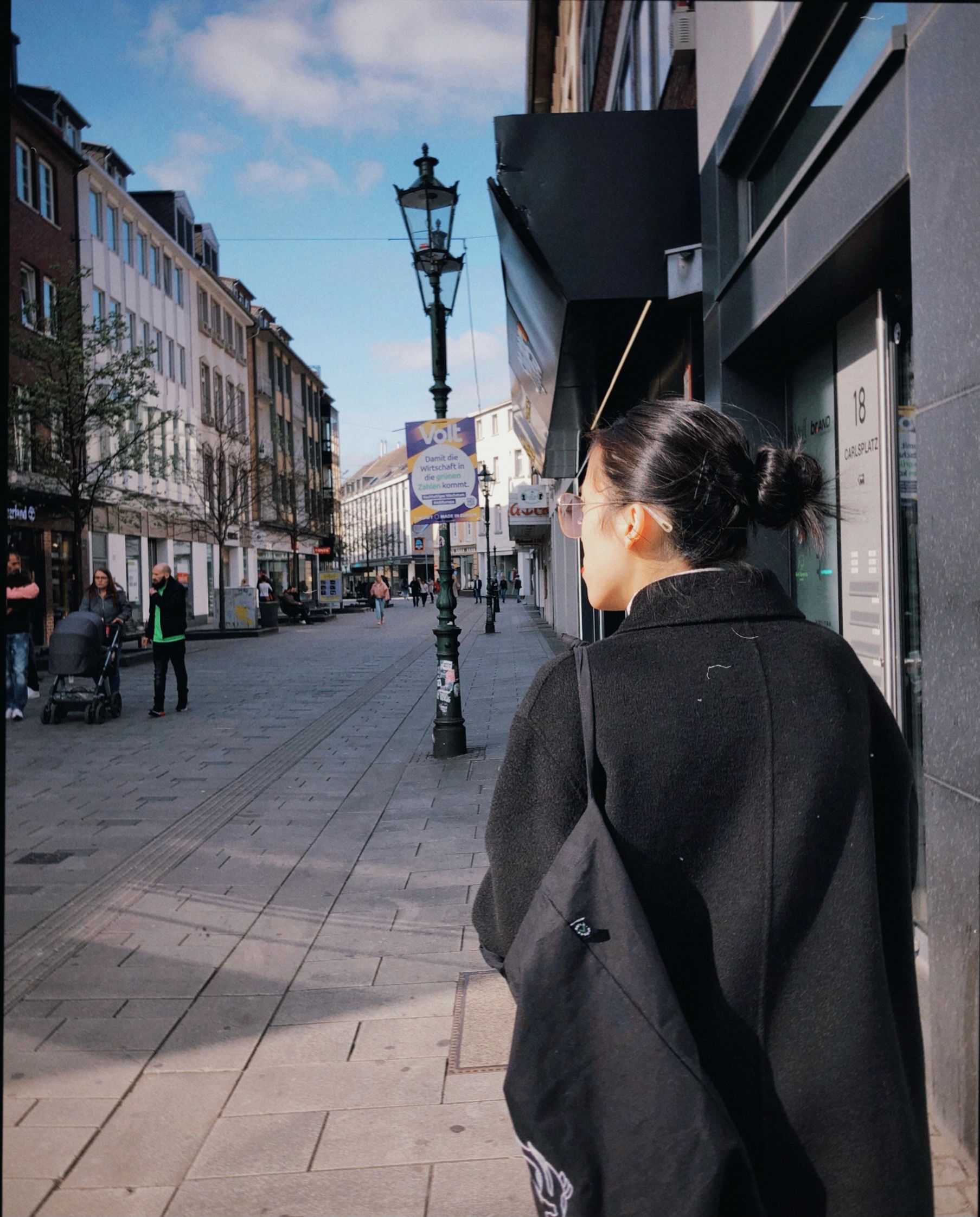 Back View of a Woman in Black Coat · Free Stock Photo