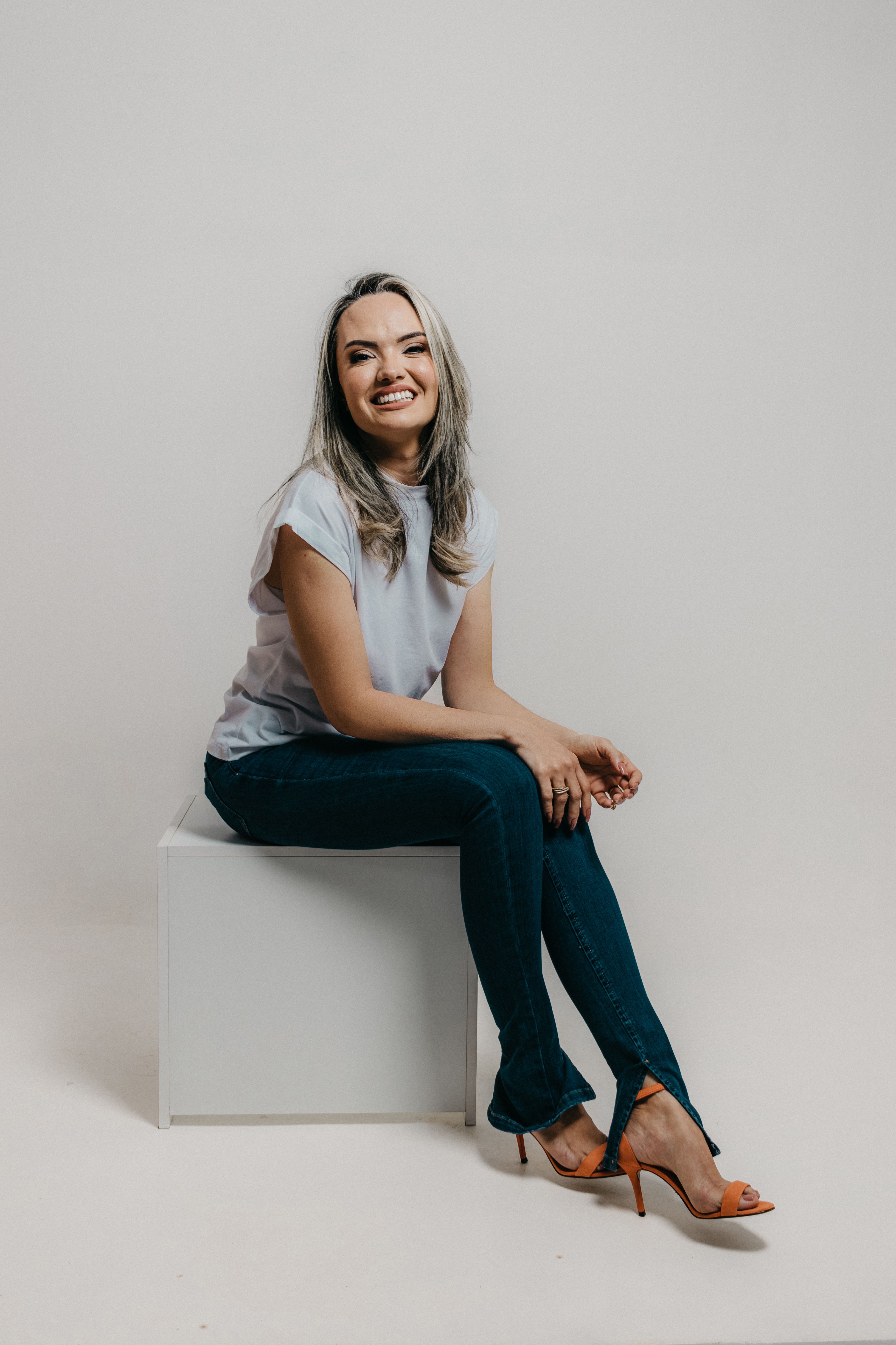 Smiling Woman Sitting · Free Stock Photo