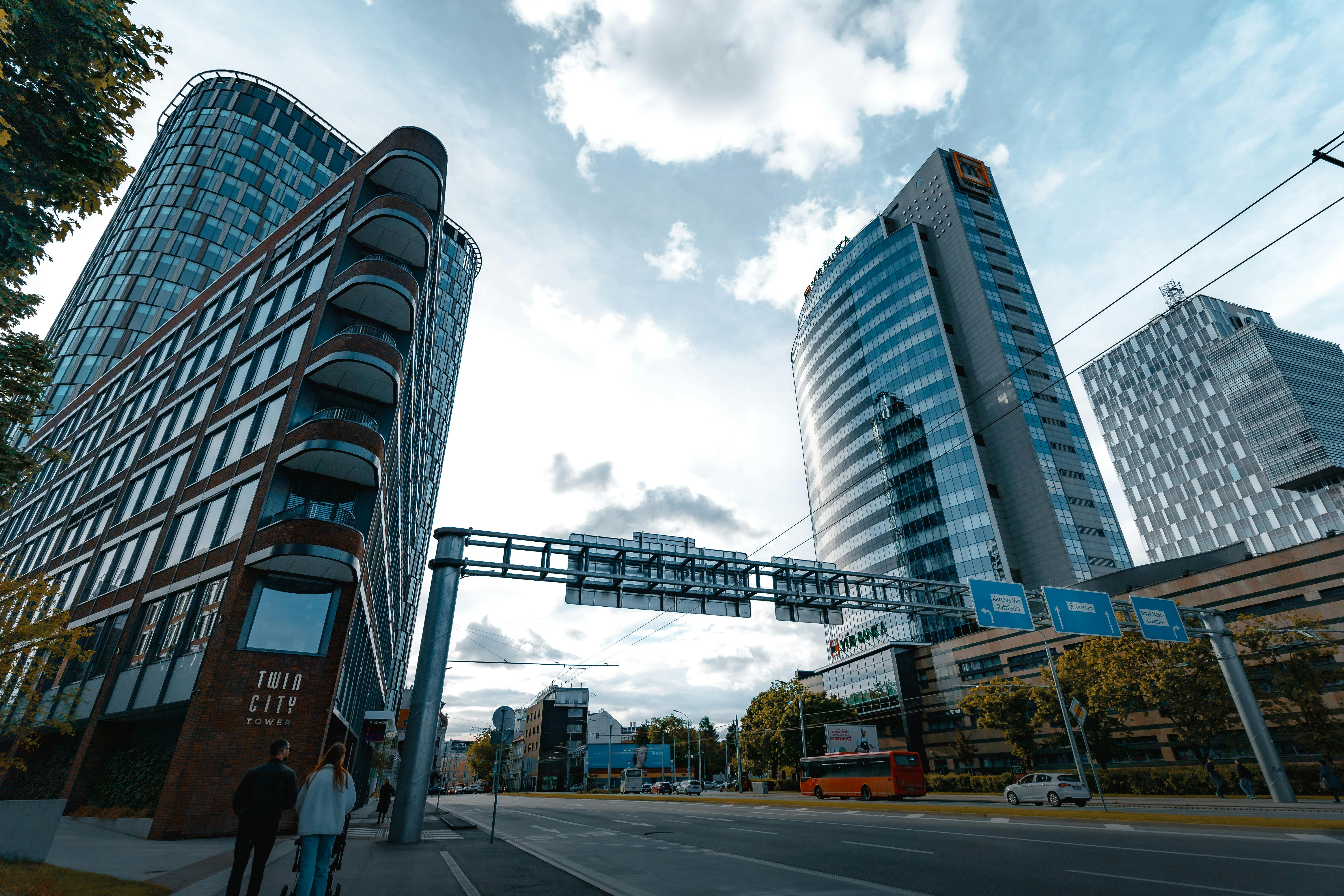 Low Angle Shot of a Street with Contemporary Steel and Glass High-Rise ...