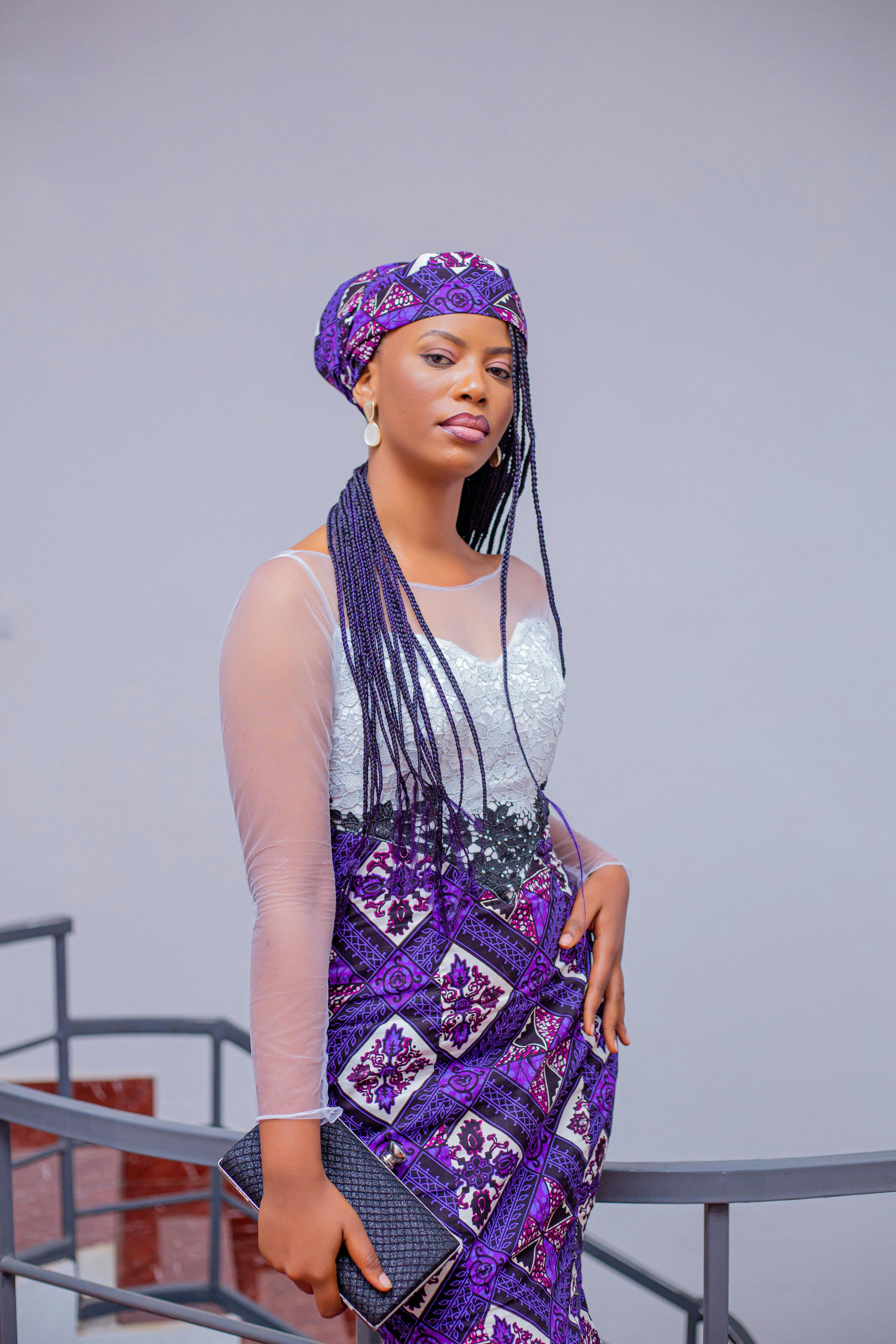 Model with Dreadlocks in Dress and Hat · Free Stock Photo