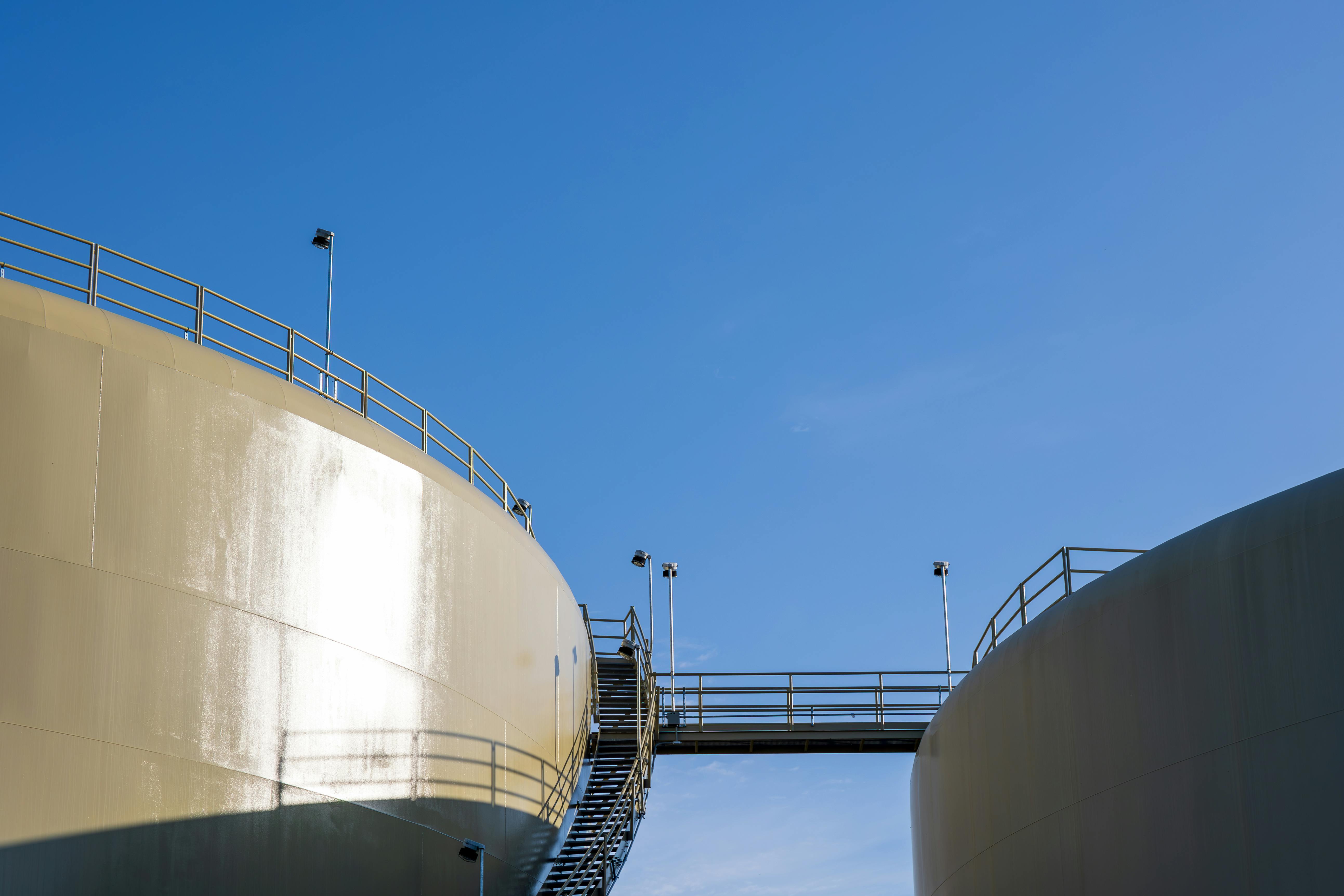 Stairs on Silos under Clear Sky · Free Stock Photo