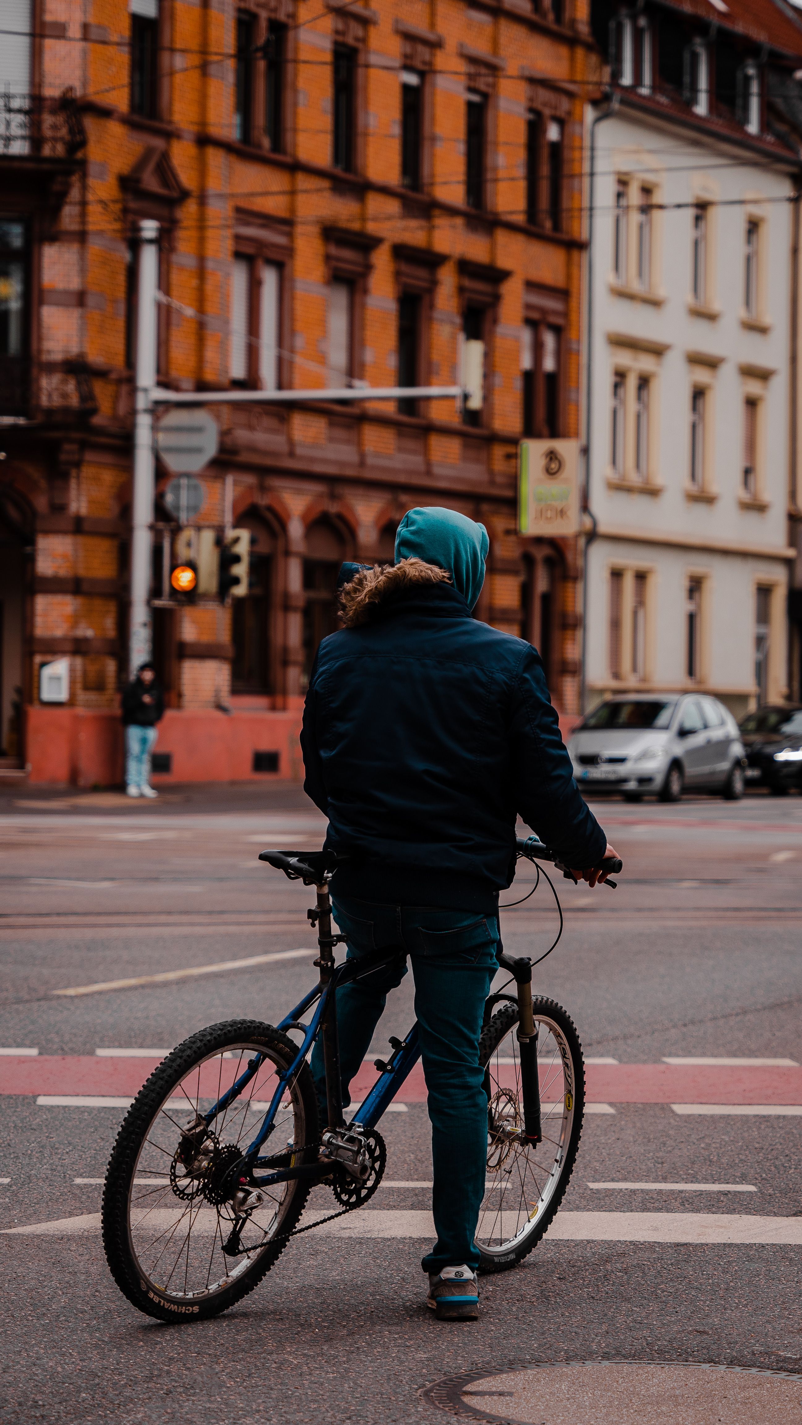 Cyclist on a Mountain Bike Waiting at the Intersection · Free Stock Photo