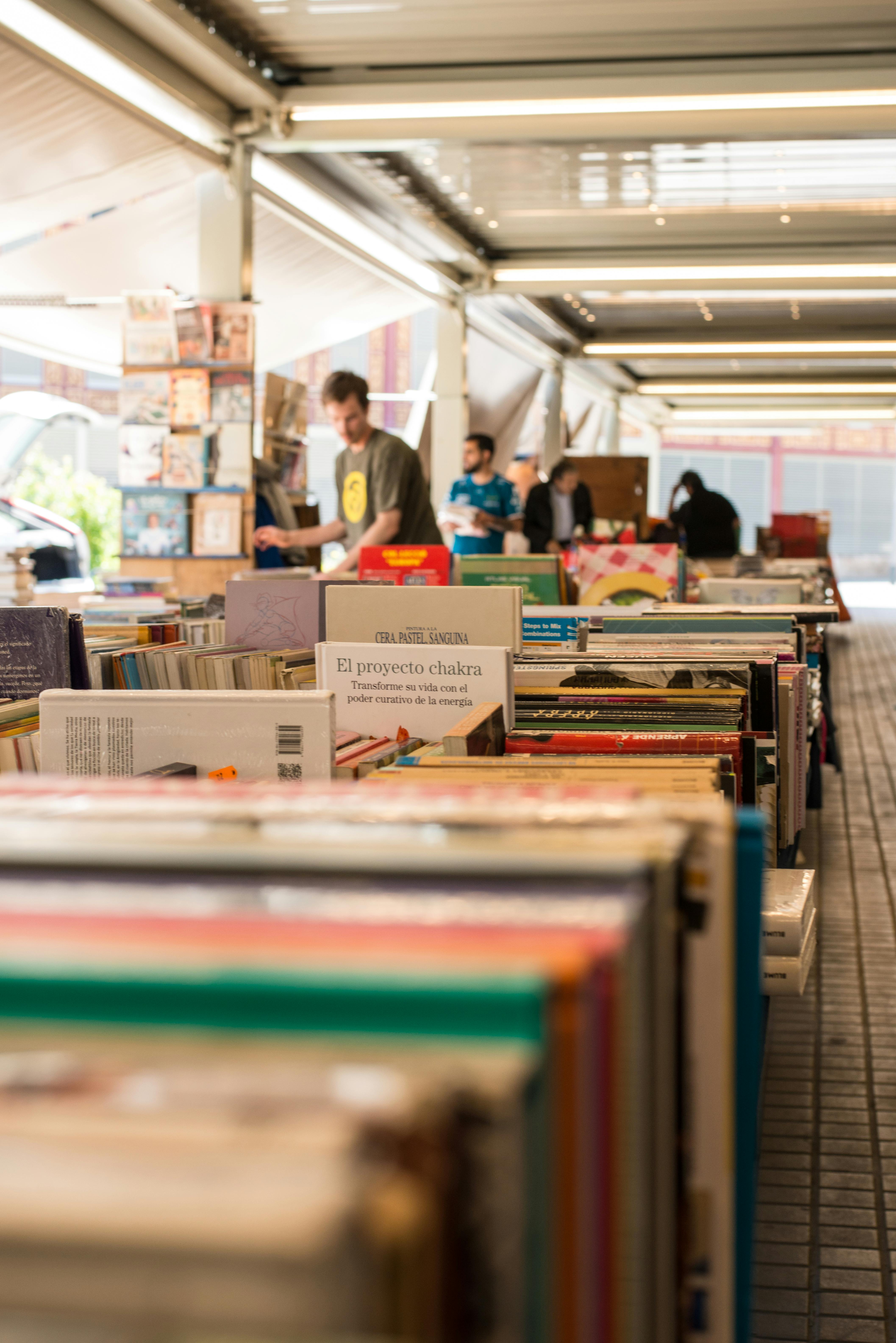 Second-hand Books on Stall Tables · Free Stock Photo