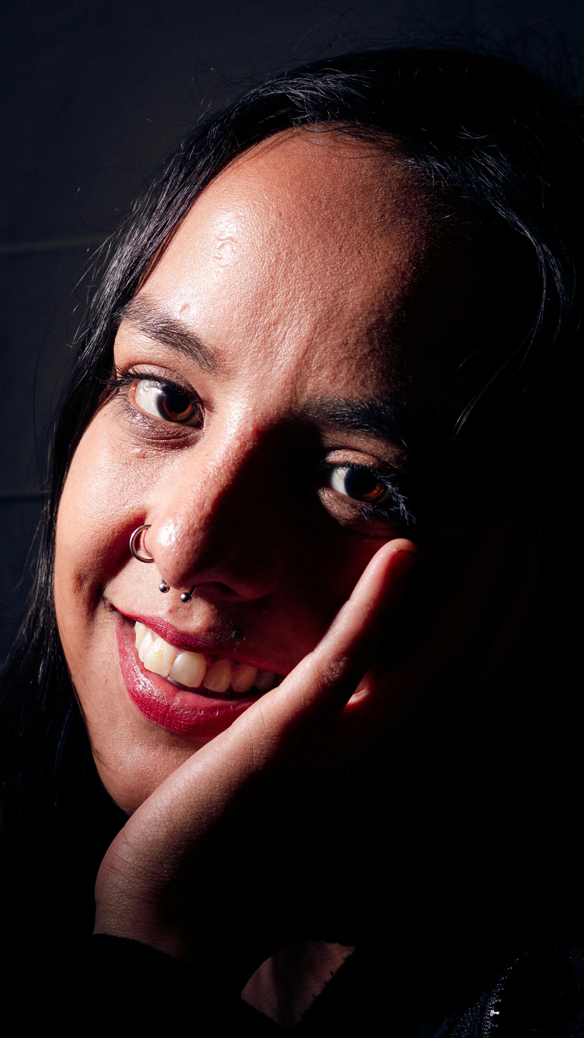 Light on Smiling Woman Face · Free Stock Photo