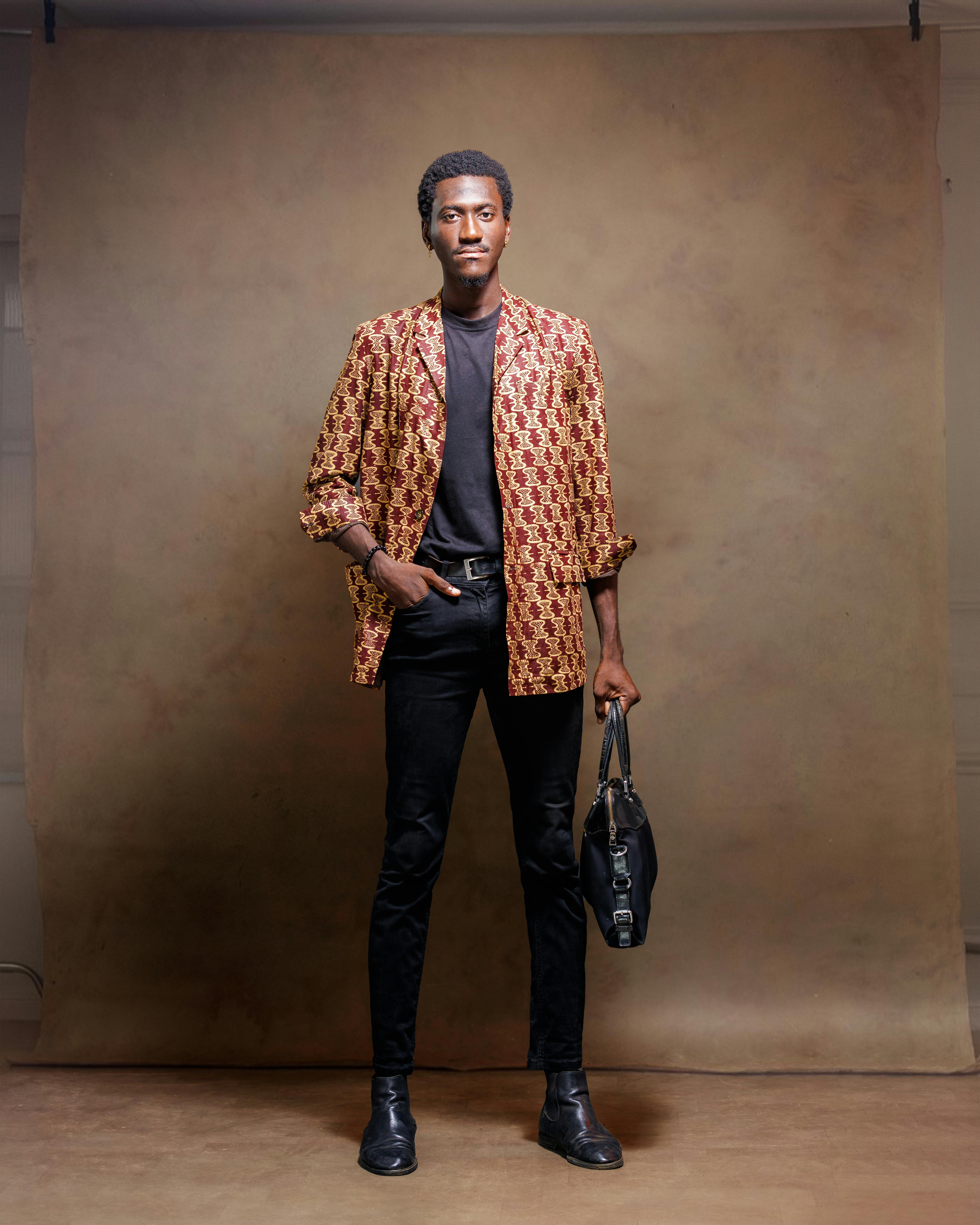 Man Posing with Bag · Free Stock Photo