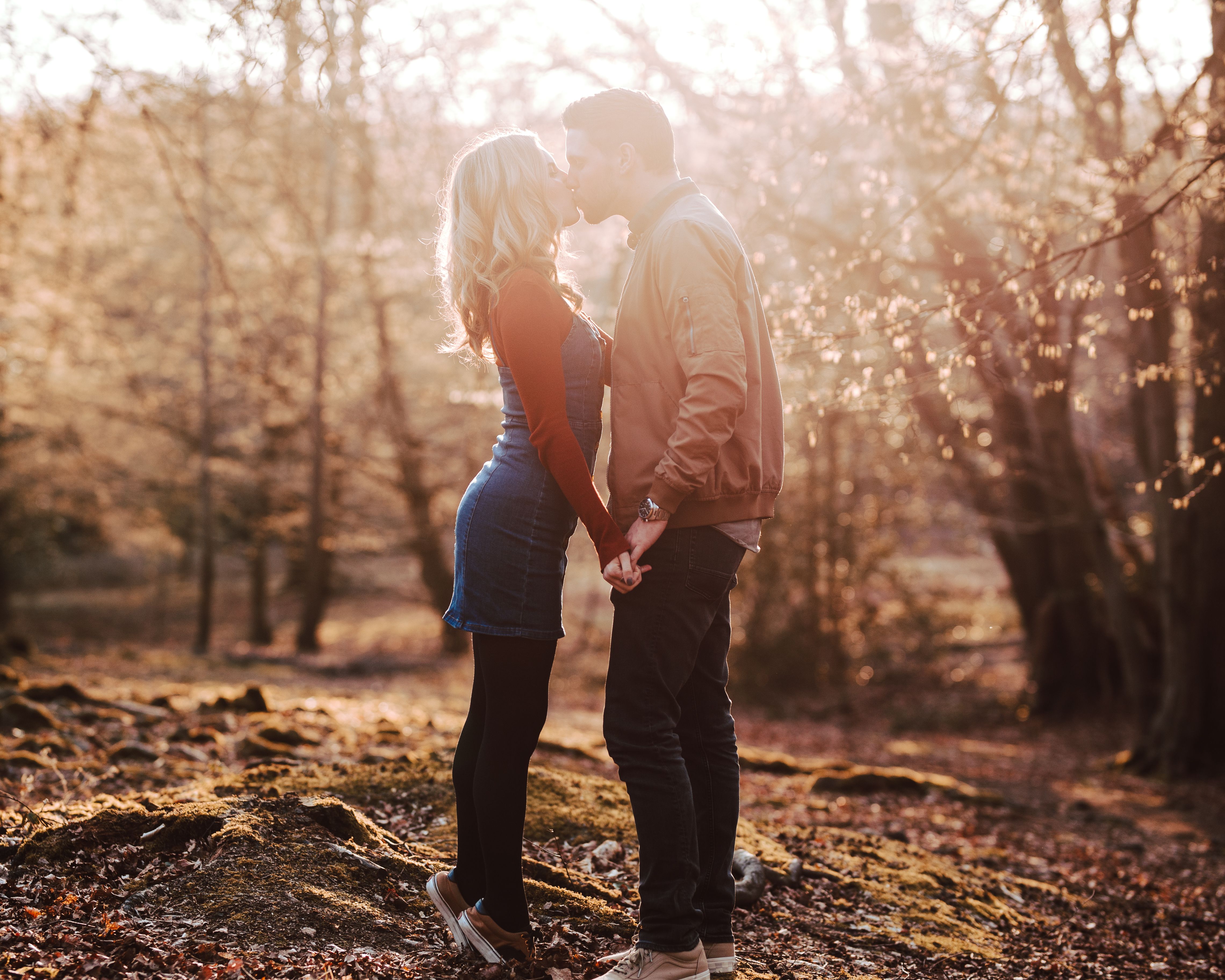 Couple Kissing under Tree · Free Stock Photo