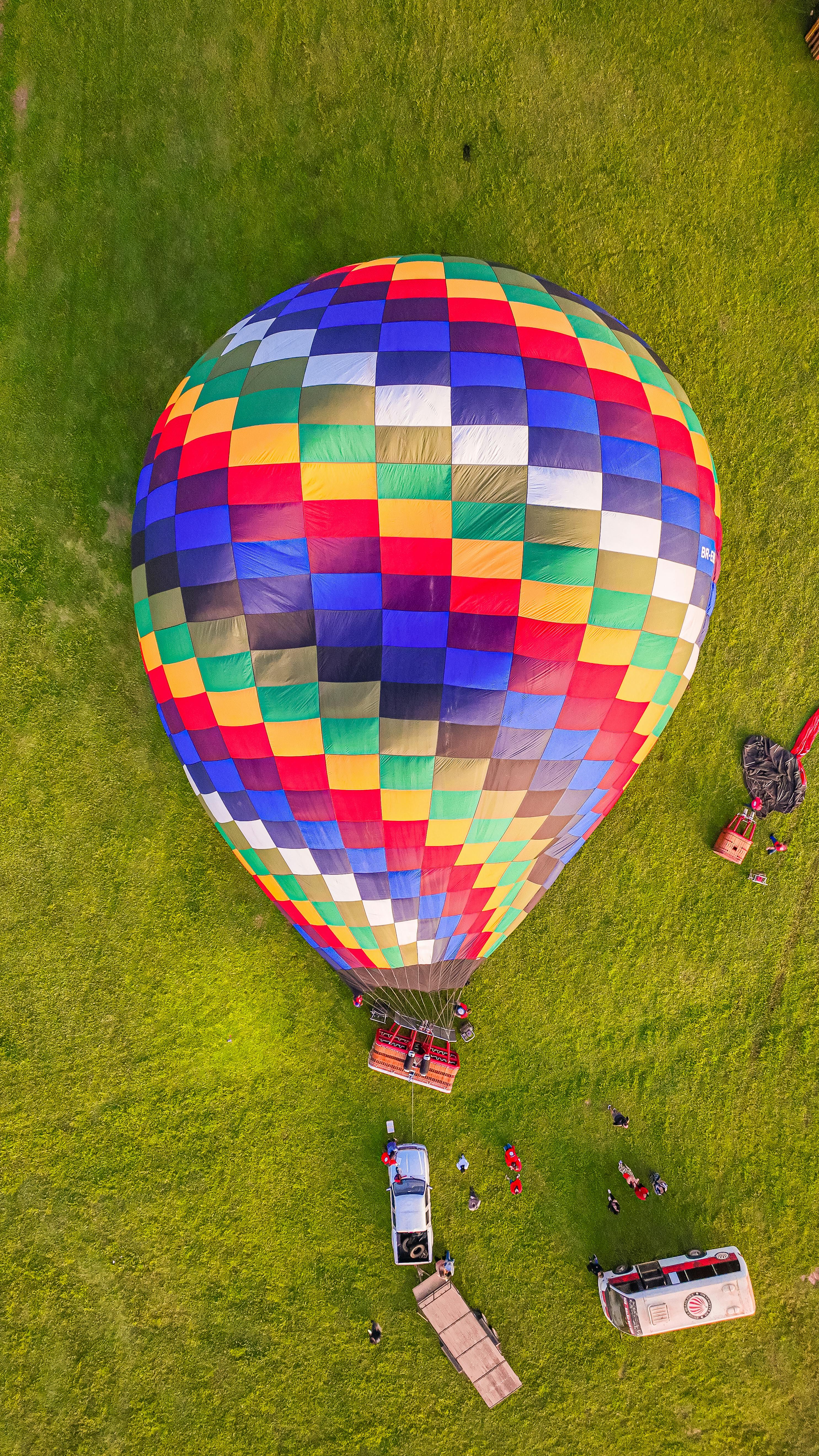 Aerial Photo of a Hot Air Balloon in the Field · Free Stock Photo