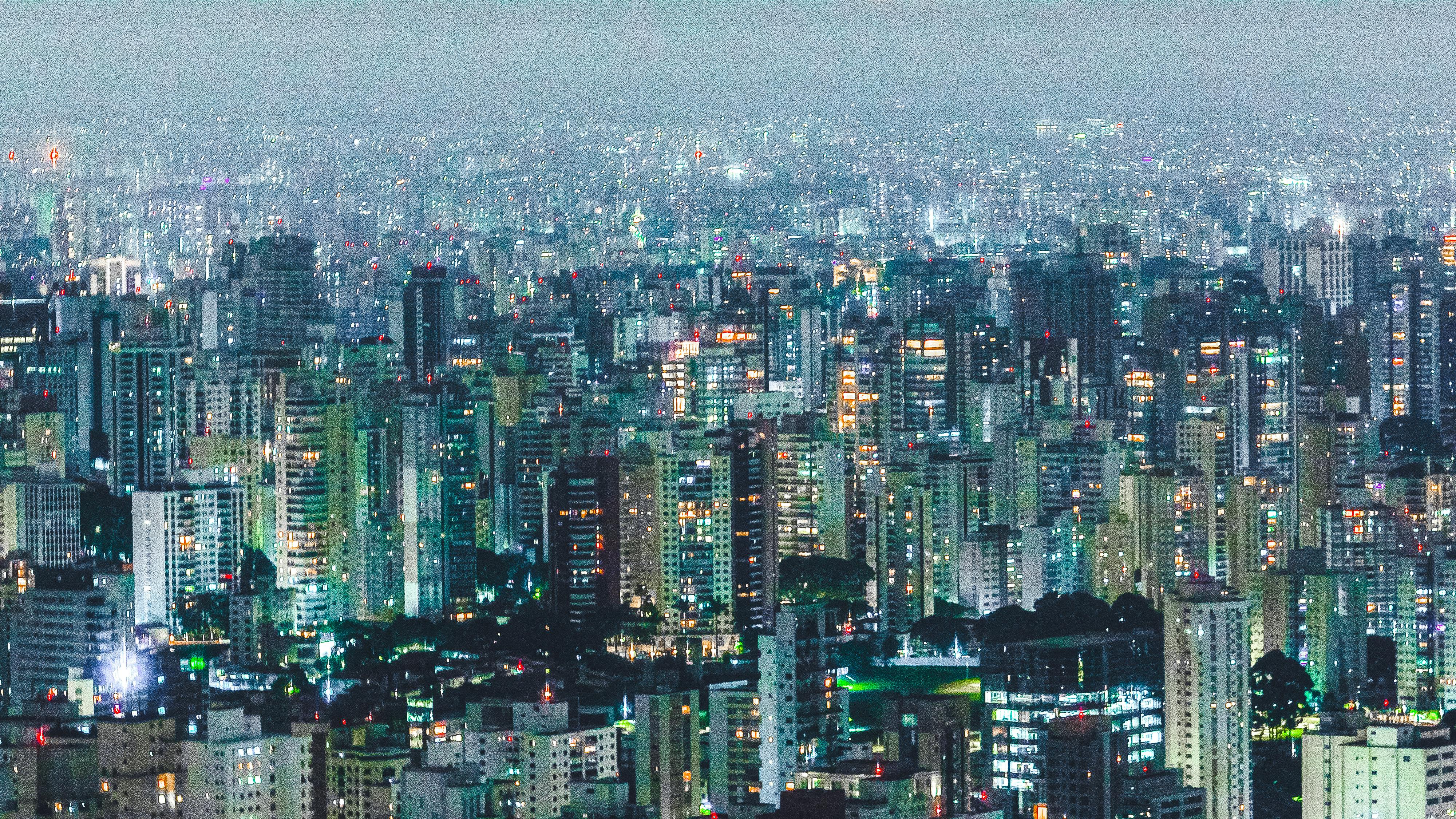 Mid and High Rise Buildings With Lights Turned on during Night · Free ...