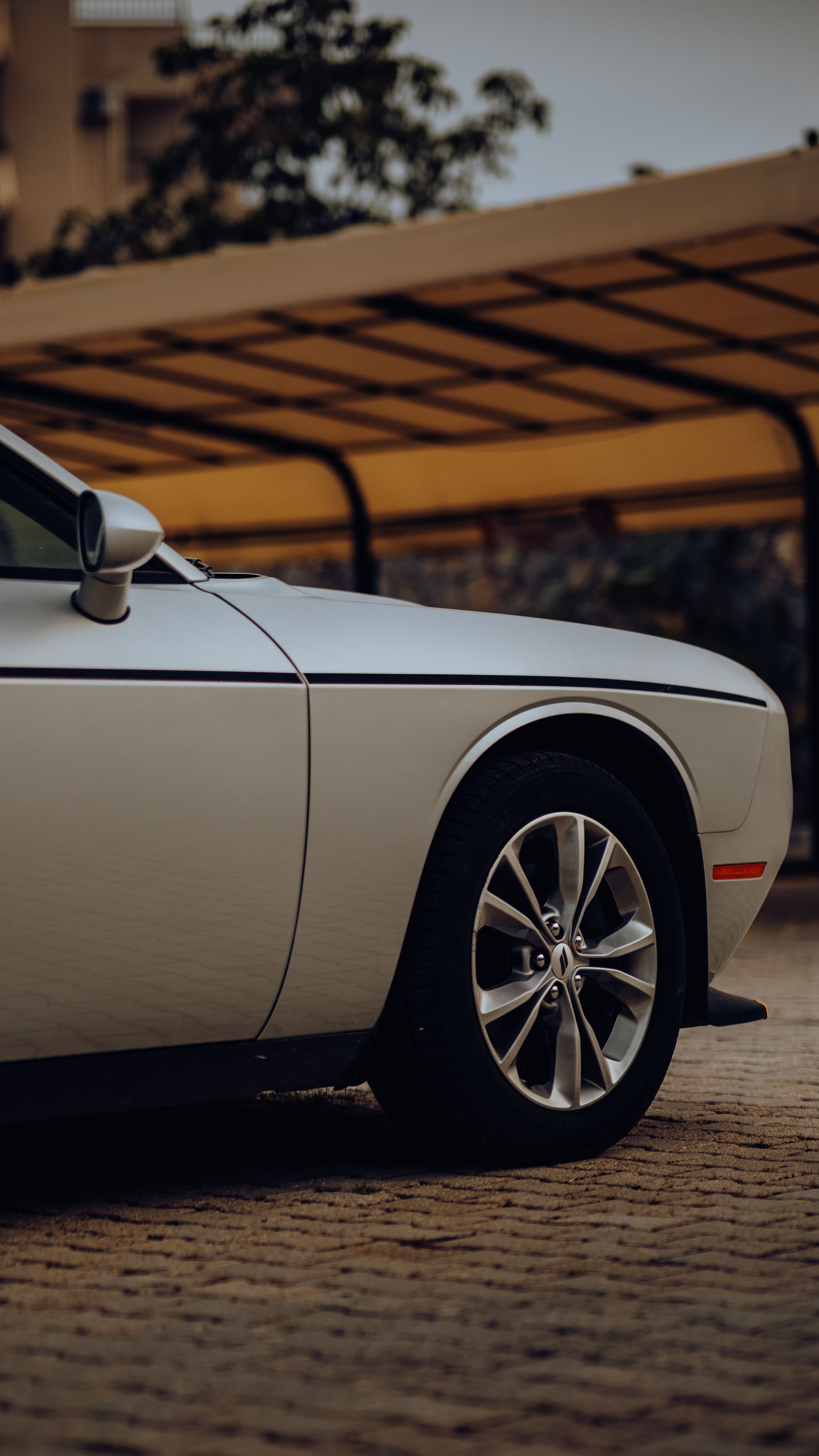 Car Parked in a Driveway · Free Stock Photo