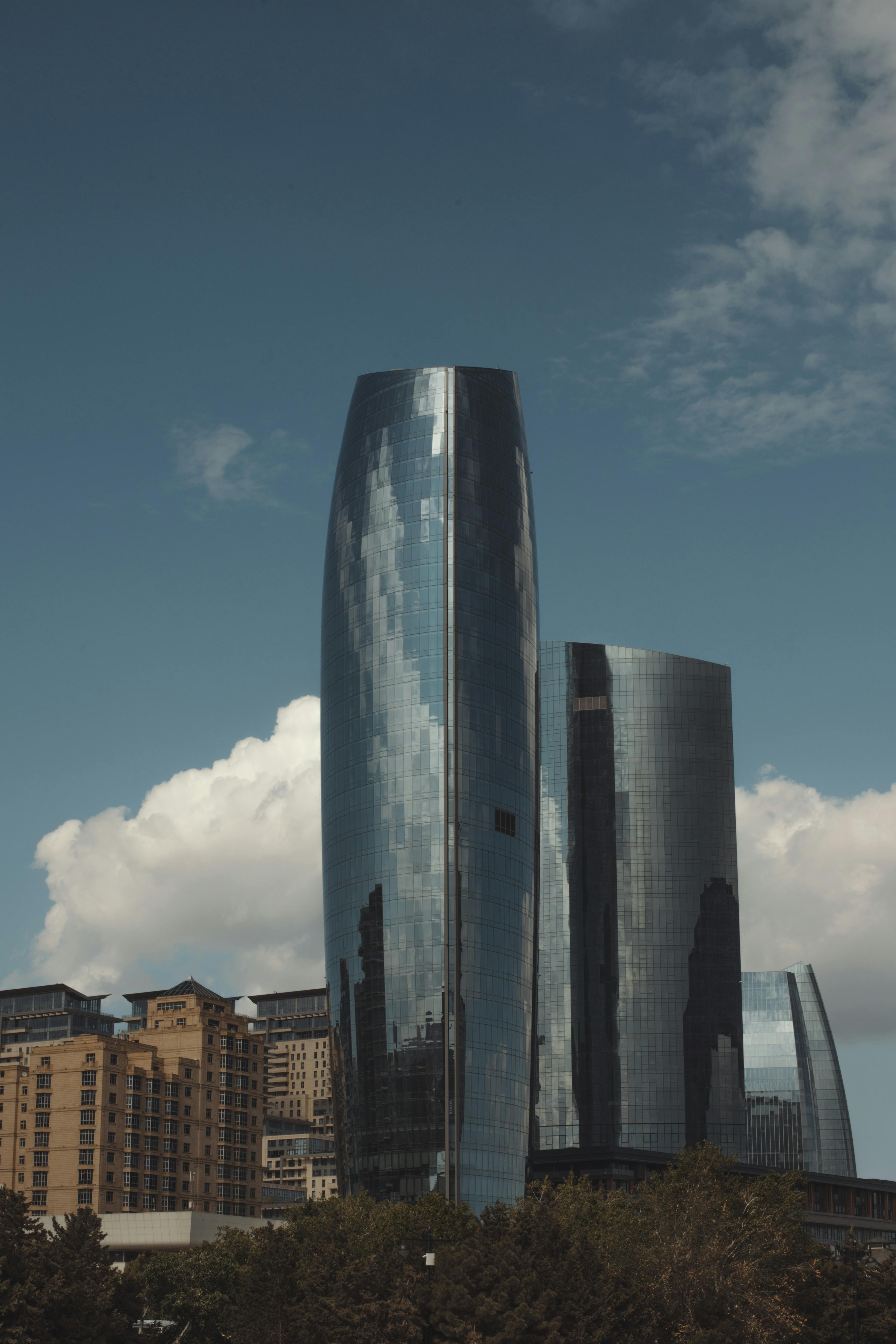 Brown High Rise Building Surrounded by People · Free Stock Photo