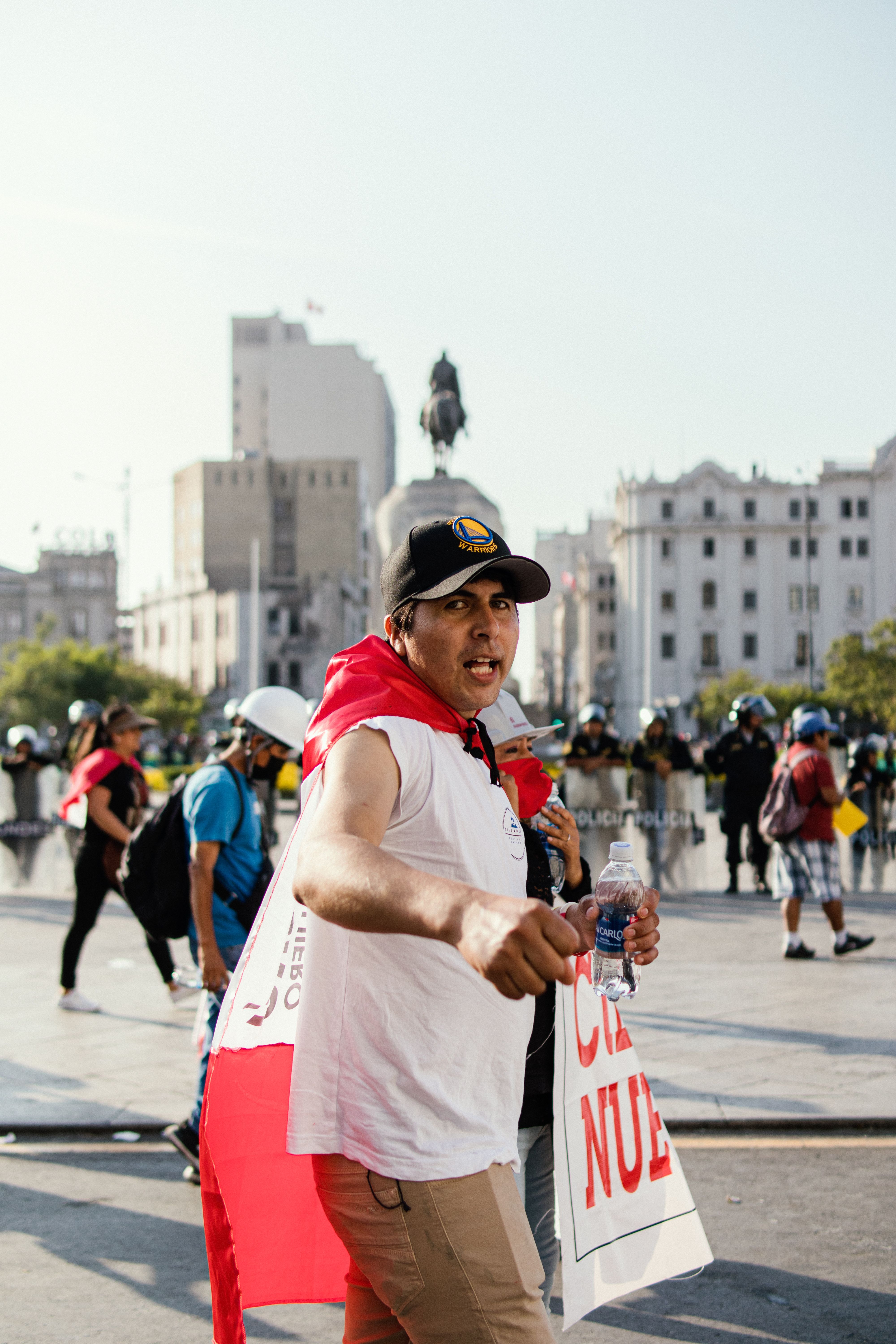 Man in Cap and with Flag of Peru at Manifestation · Free Stock Photo